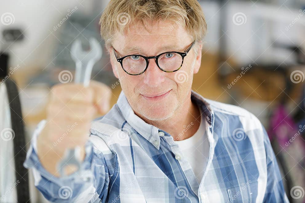 Man Showing Spanner at Camera Stock Image - Image of business, show ...
