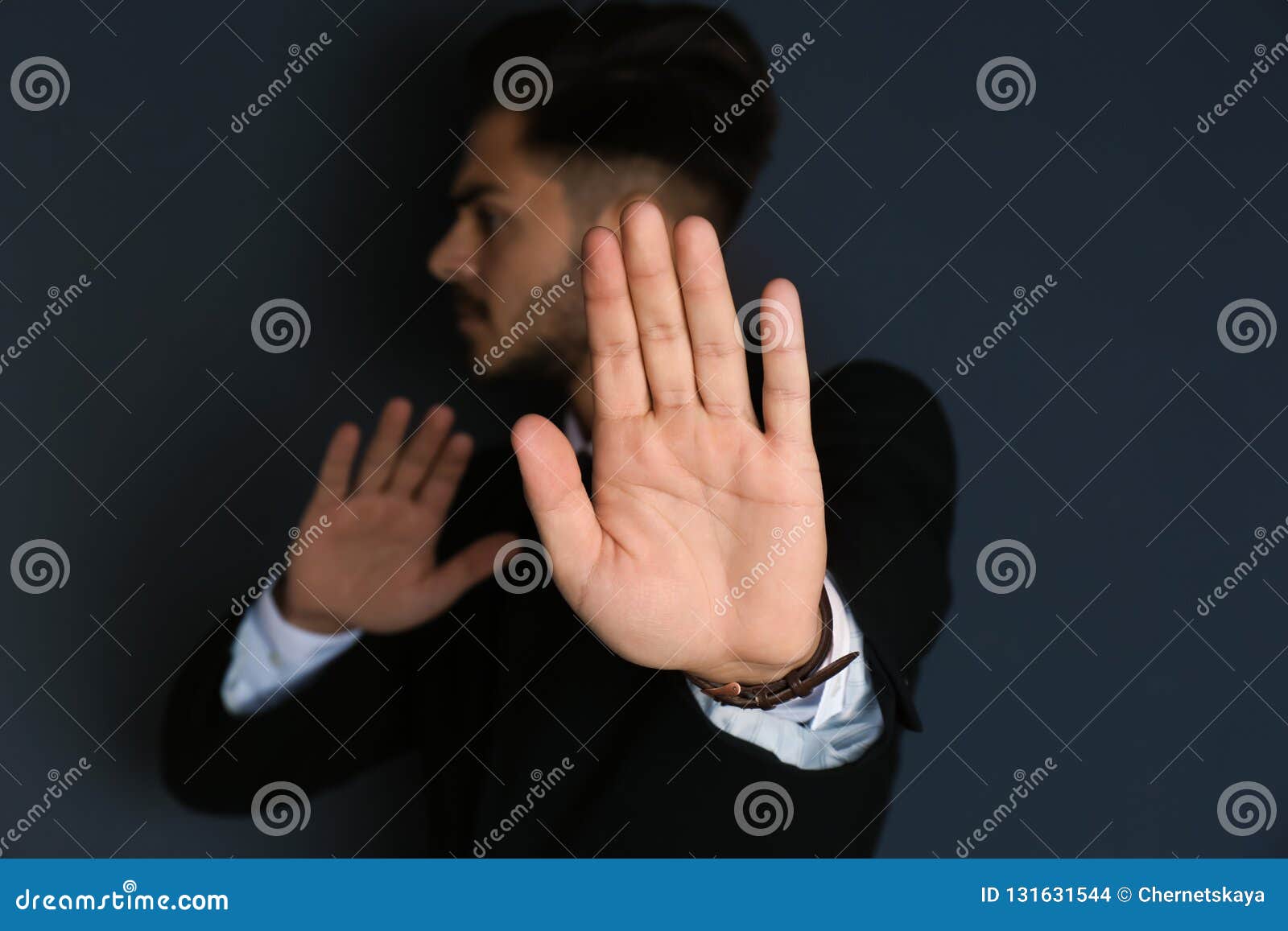 Man showing stop gesture stock photo. Image of abuse - 131631544