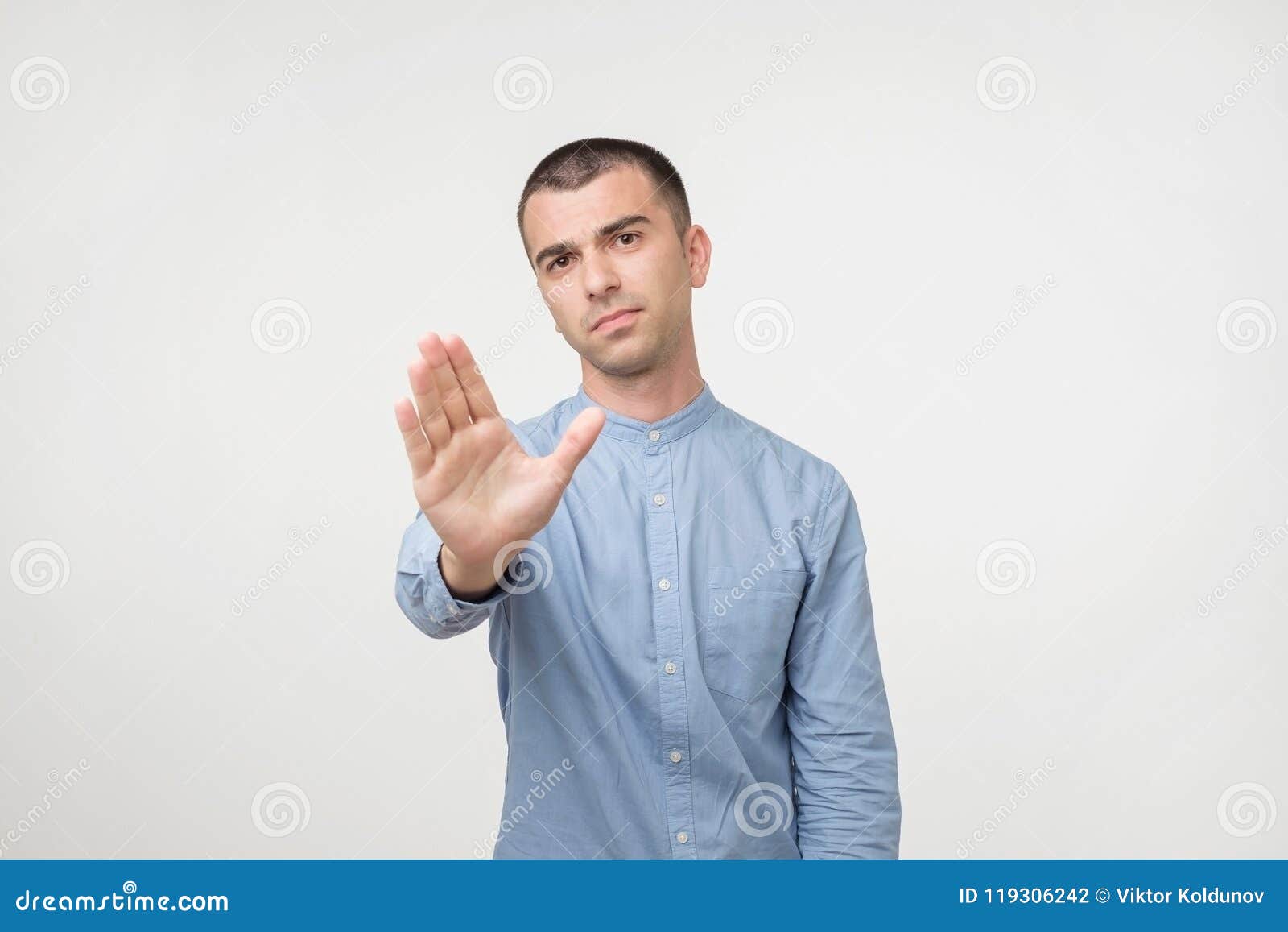 Man showing stop gesture stock photo. Image of gray - 119306242 Man showing stop gesture stock photo. Image of gray - 119306242