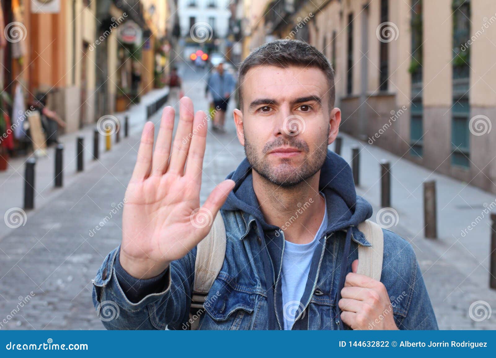 Man Showing a STOP Hand Sign Stock Photo - Image of industrial, command ...