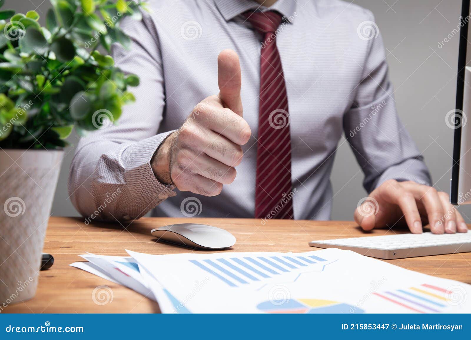 Man Showing Thumb Up while Sitting at His Desk Stock Image - Image of ...