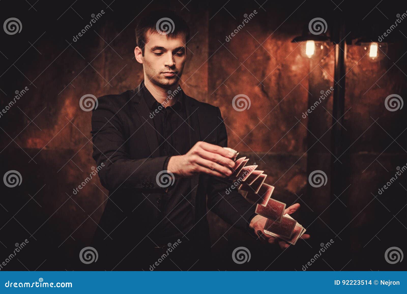 Man Showing Tricks with Cards Stock Photo - Image of illusion ...