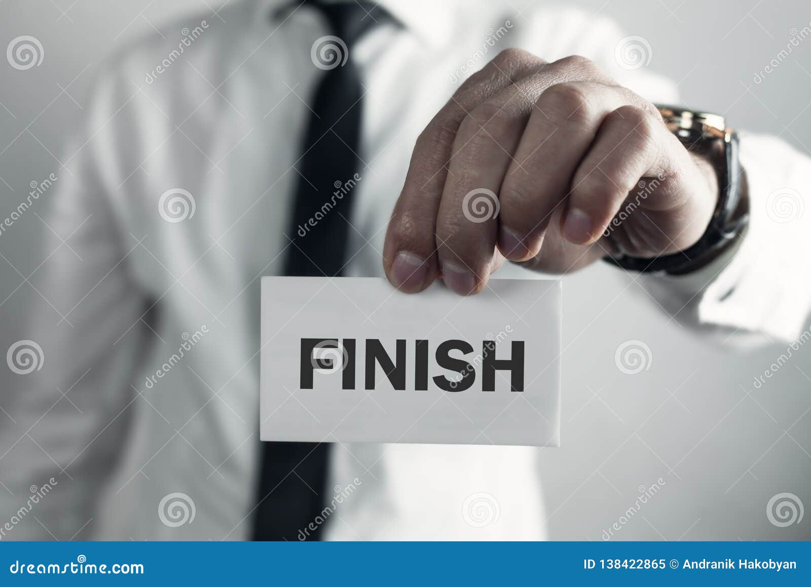 Man Showing Word Finish on Business Card Stock Image - Image of ...