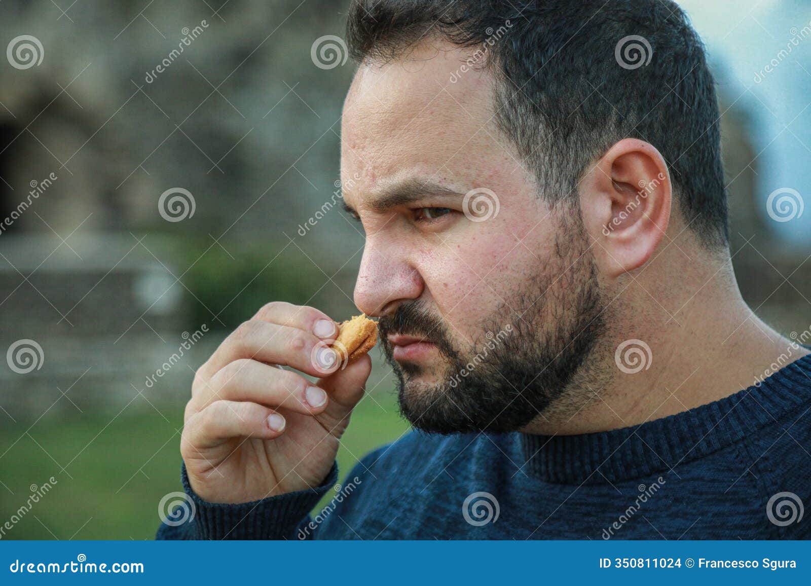 Man Shows Disgust after Biscuit Smelling Stock Photo - Image of face ...