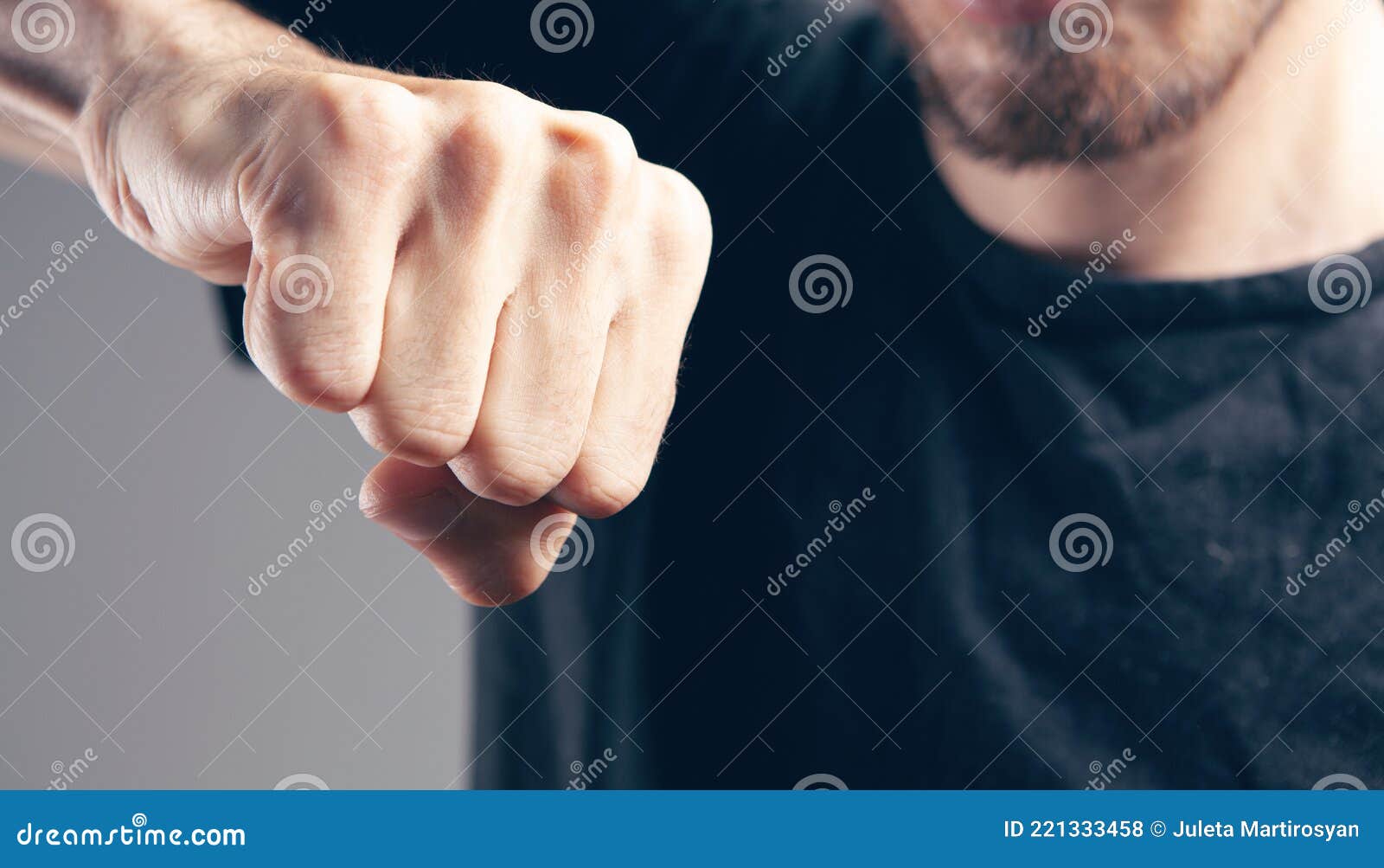 Man shows fist stock photo. Image of fist, shows, adult - 221333458