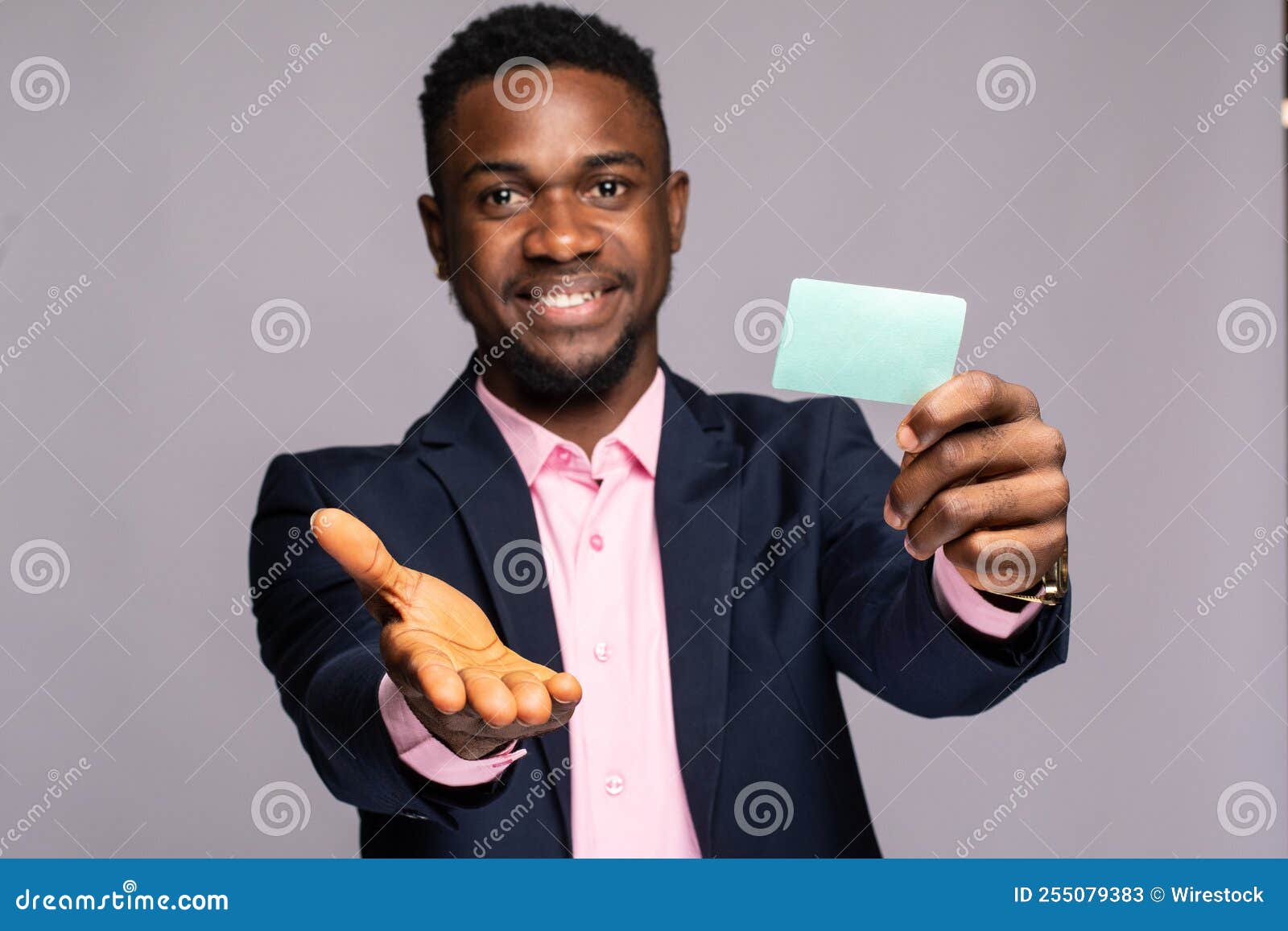 Man shows a plain card stock image. Image of millennial - 255079383