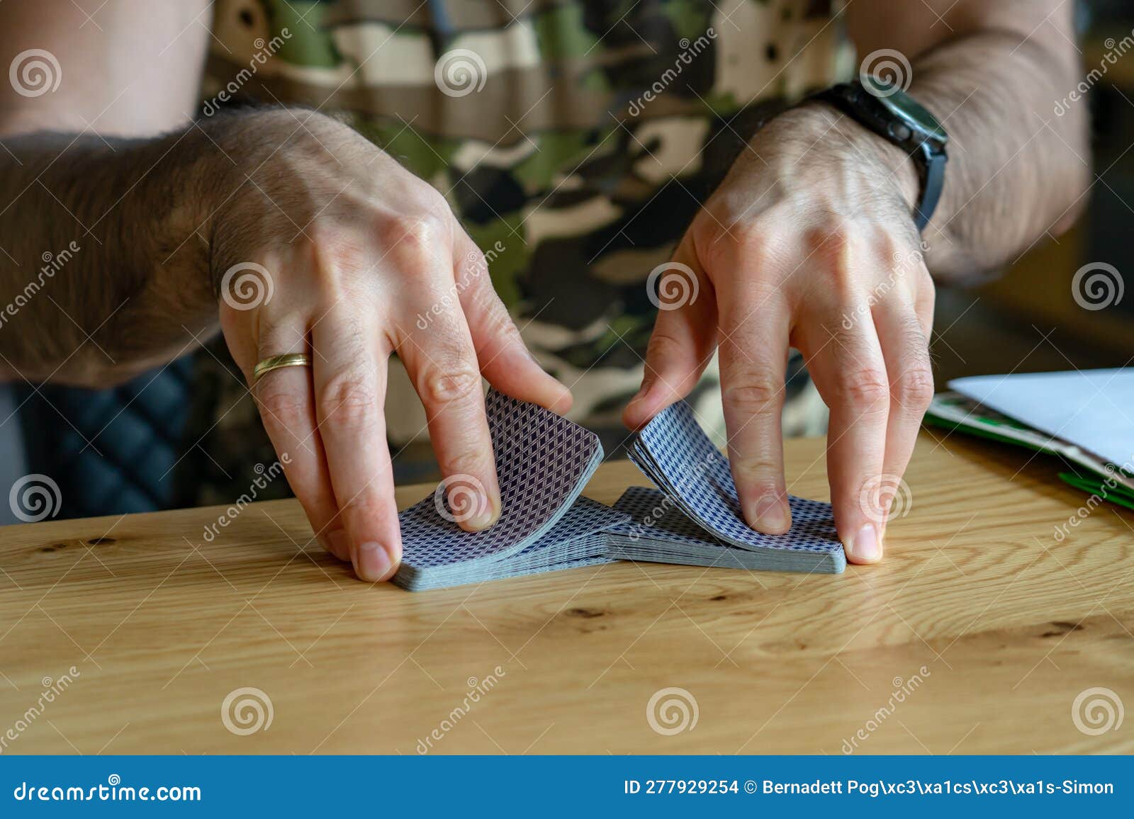 Man Shuffle Cards while Playing with Friends Stock Photo - Image of ...