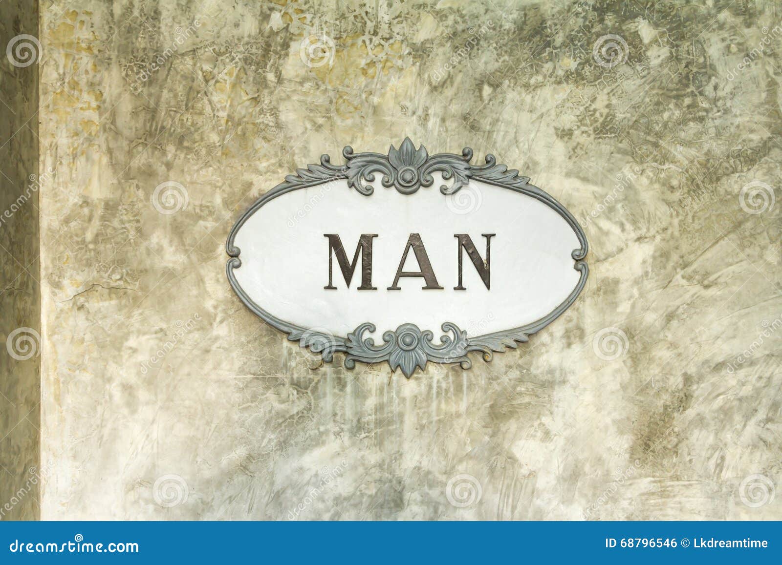 Man sign on concrete wall. stock photo. Image of design - 68796546