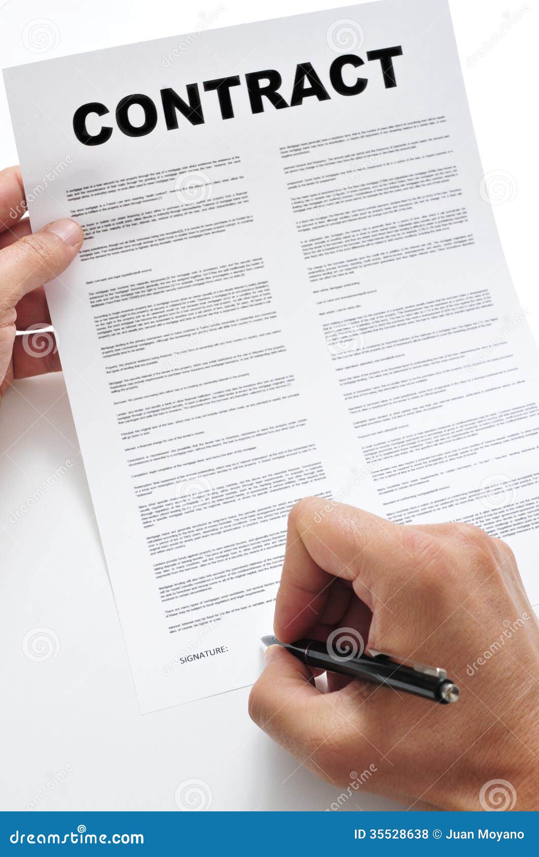 A man signing a contract stock photo. Image of business - 35528638