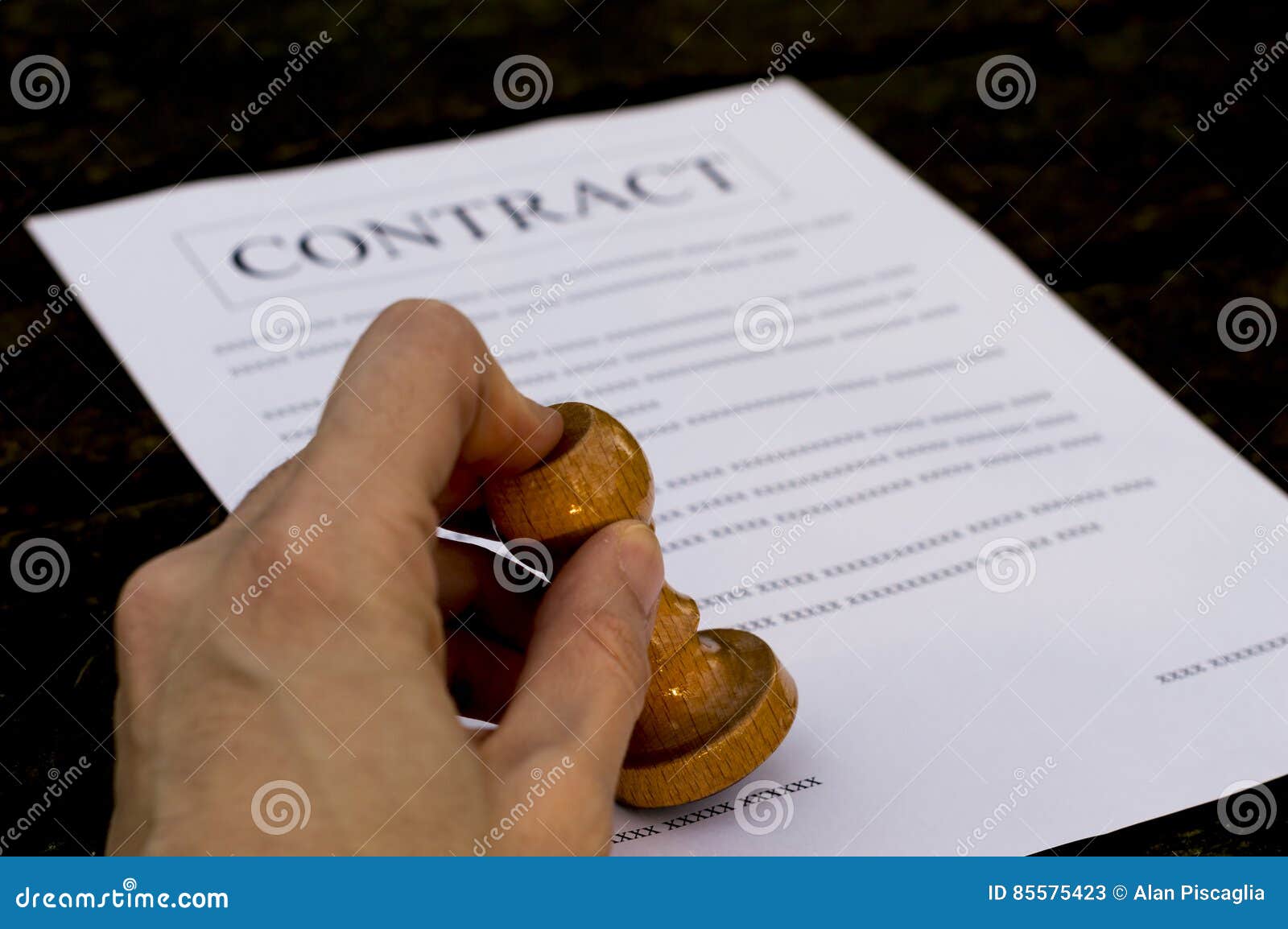 Man signs contract stock image. Image of stamp, approved - 85575423