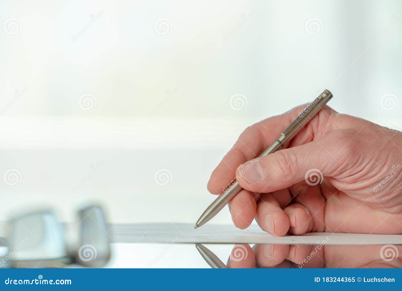Man Signs a Document Form with a Ballpoint Pen in the Office Stock ...