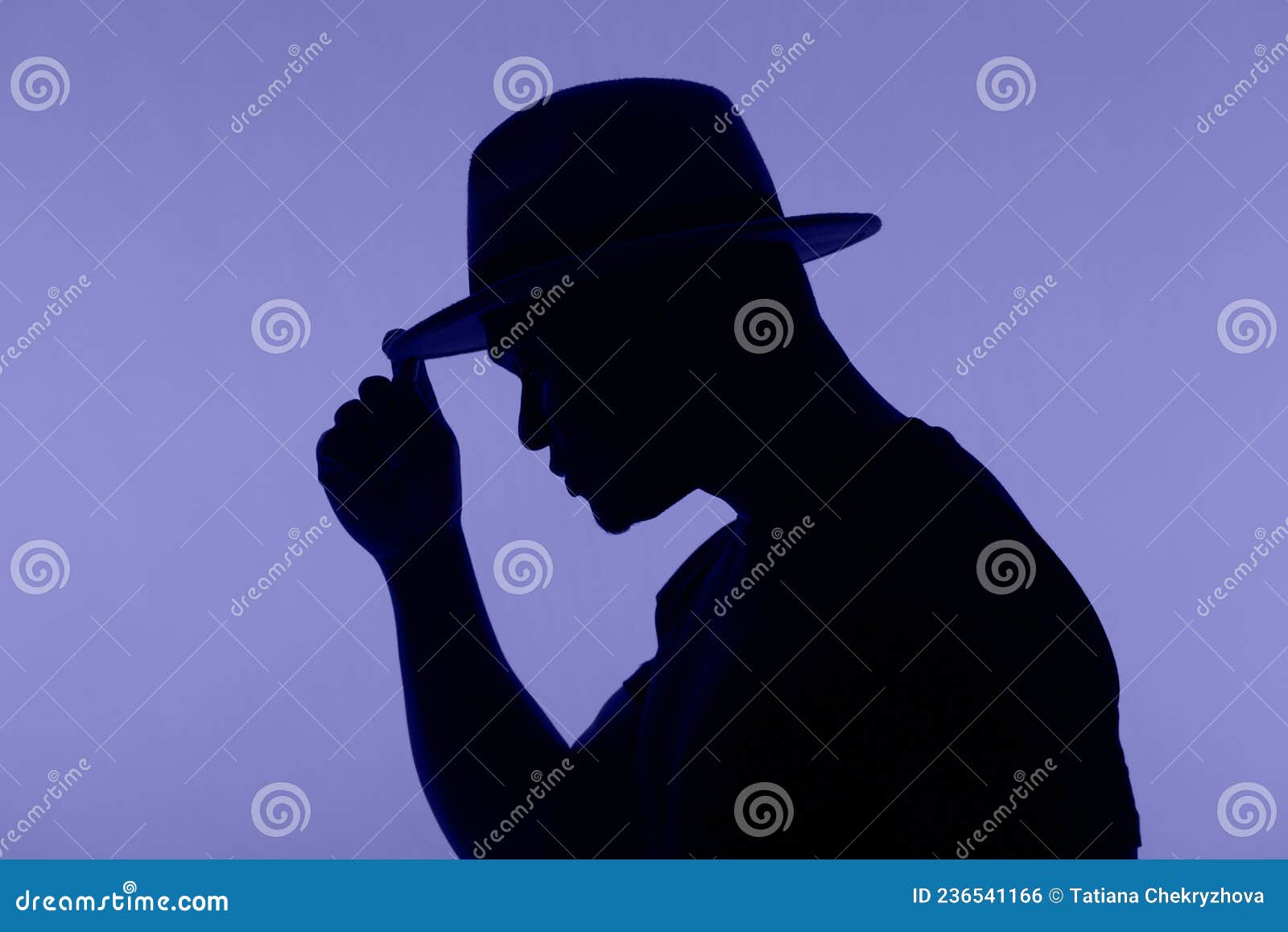 Man Silhouette Pose with Hat on Very Peri Colour of 2022 Background ...