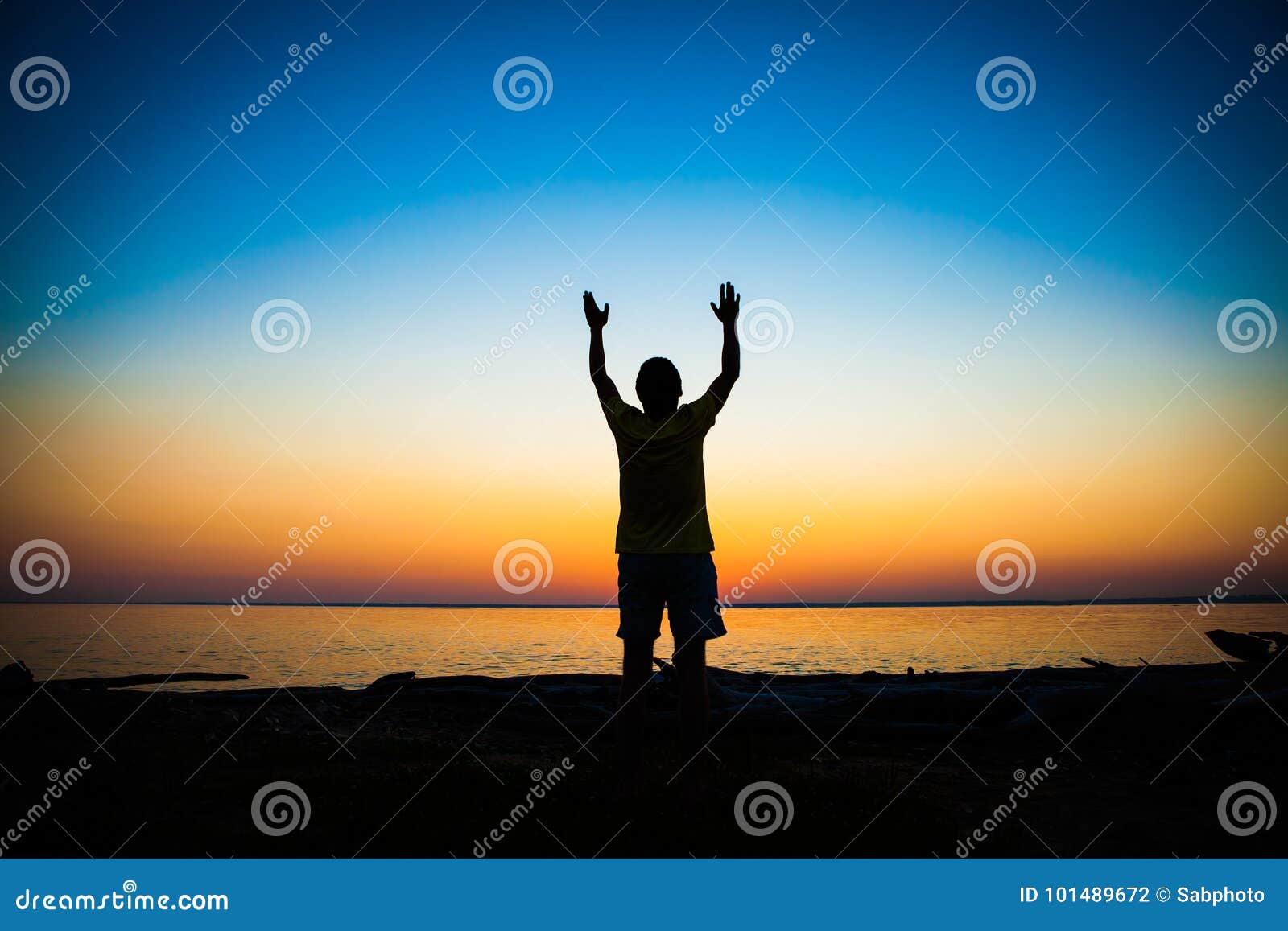Person Praying at Sunset stock photo. Image of rapture - 101489672