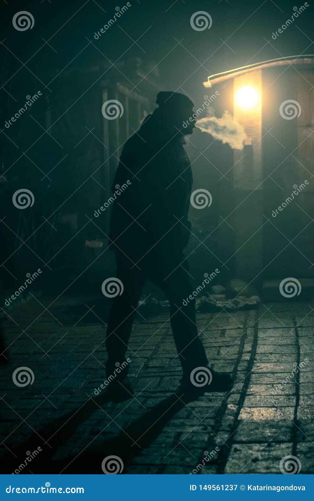 Smoking alone at night stock image. Image of mist, ecology - 149561237