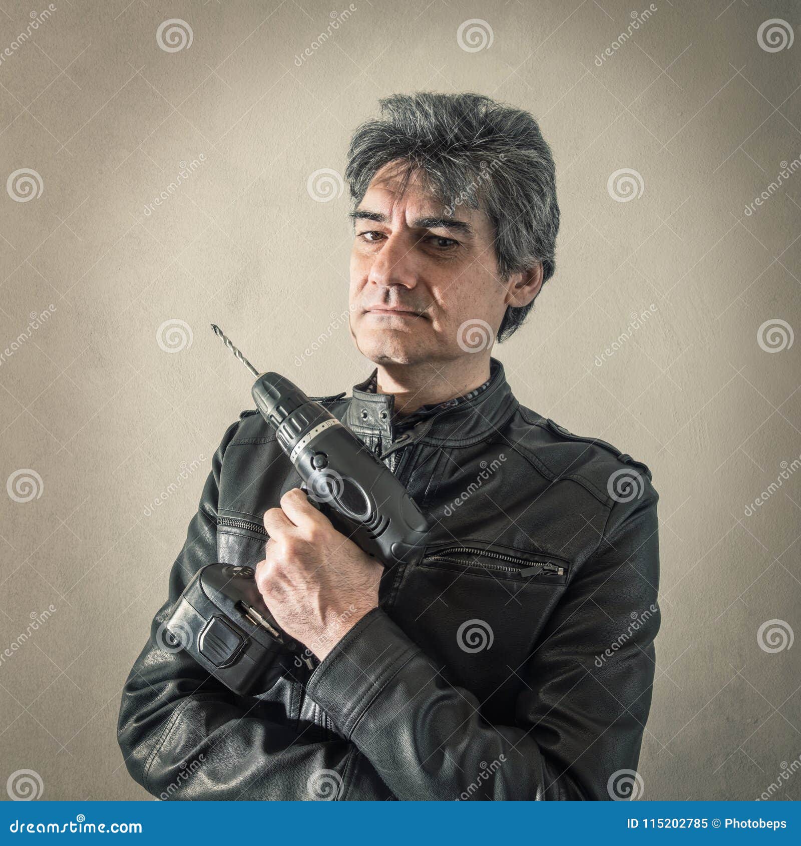 Man Simulating a Secret Agent with Drill Stock Image - Image of ...
