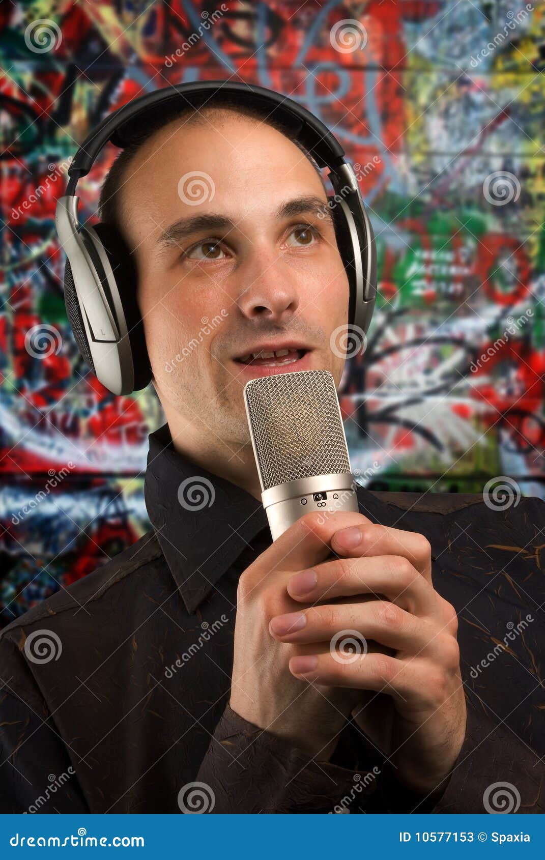 A man singing stock image. Image of earphones, phones - 10577153
