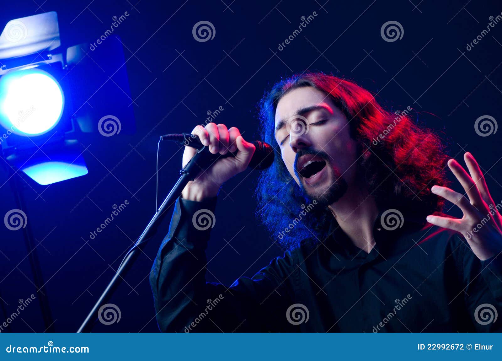 Man singing at the concert stock photo. Image of person - 22992672