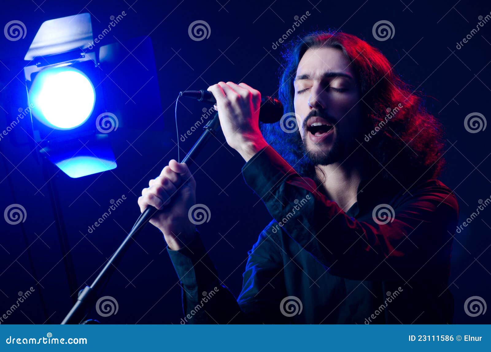 Man singing at the concert stock photo. Image of microphone - 23111586