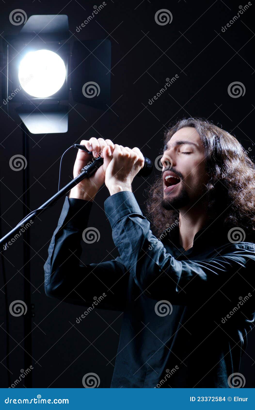 Man singing at the concert stock photo. Image of microphone - 23372584