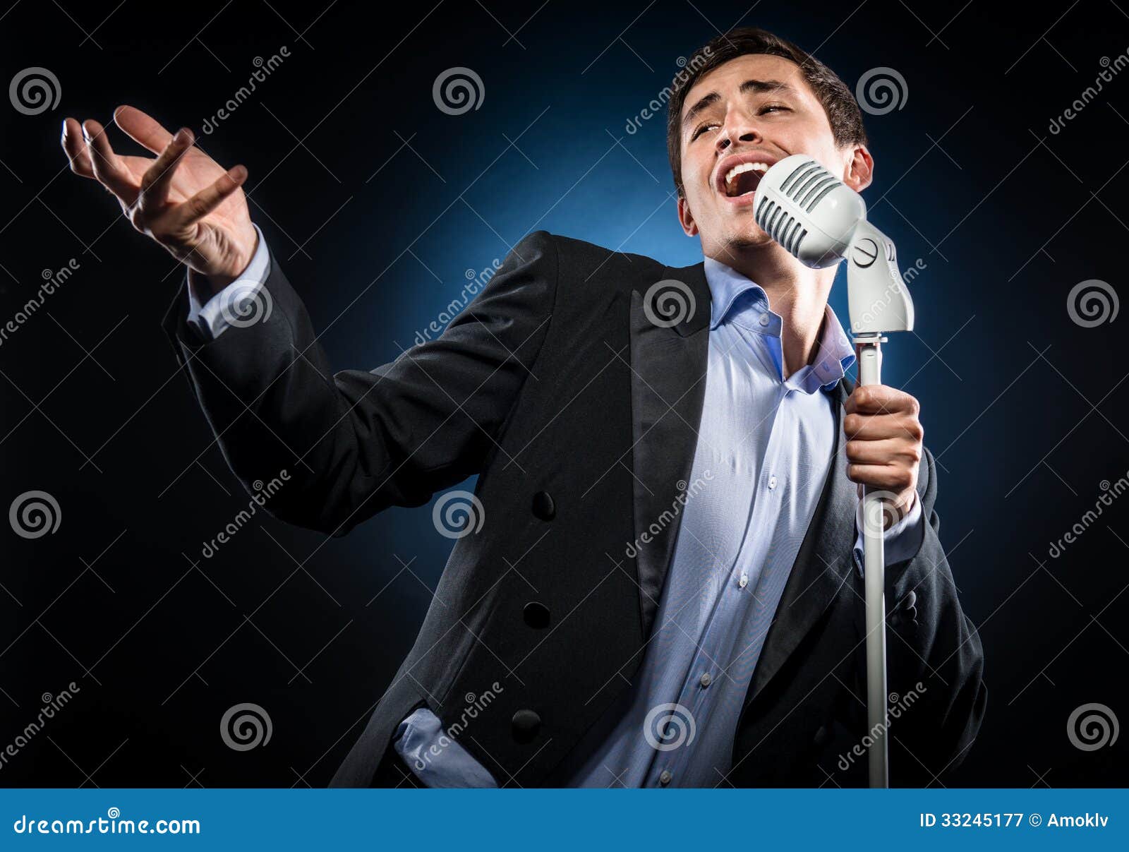 Man singing stock image. Image of microphone, elegant - 33245177