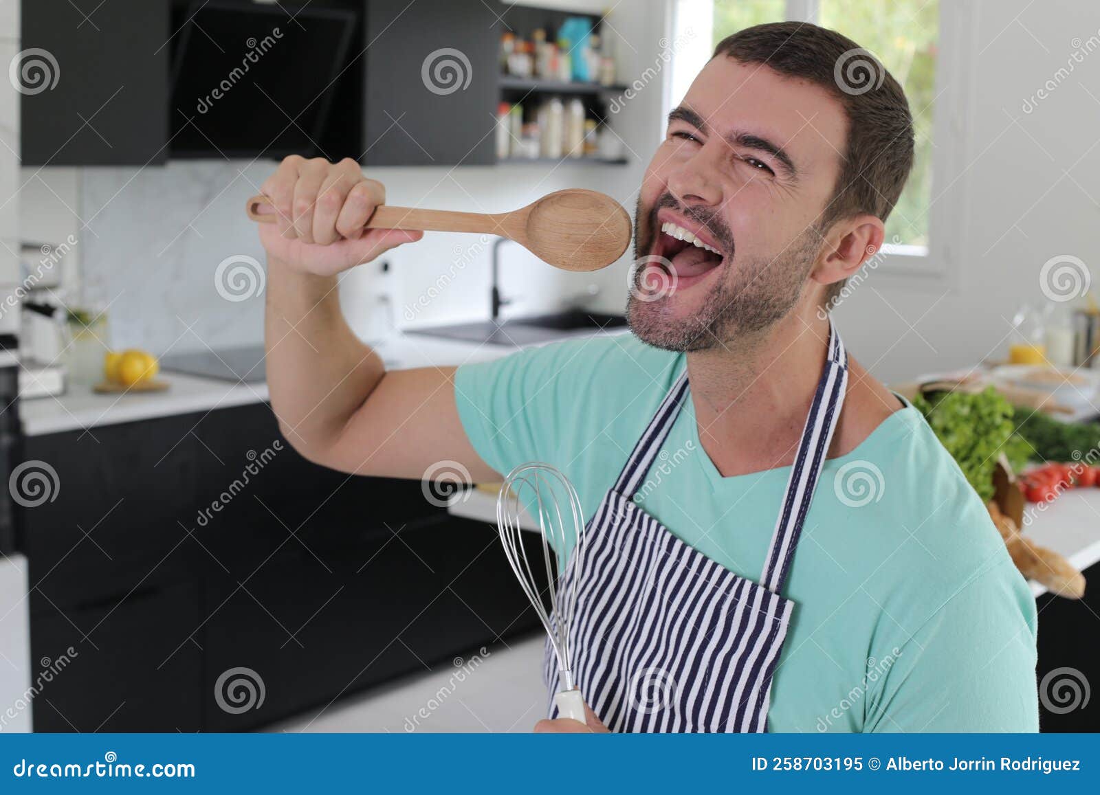 Man singing in the kitchen stock image. Image of house - 258703195