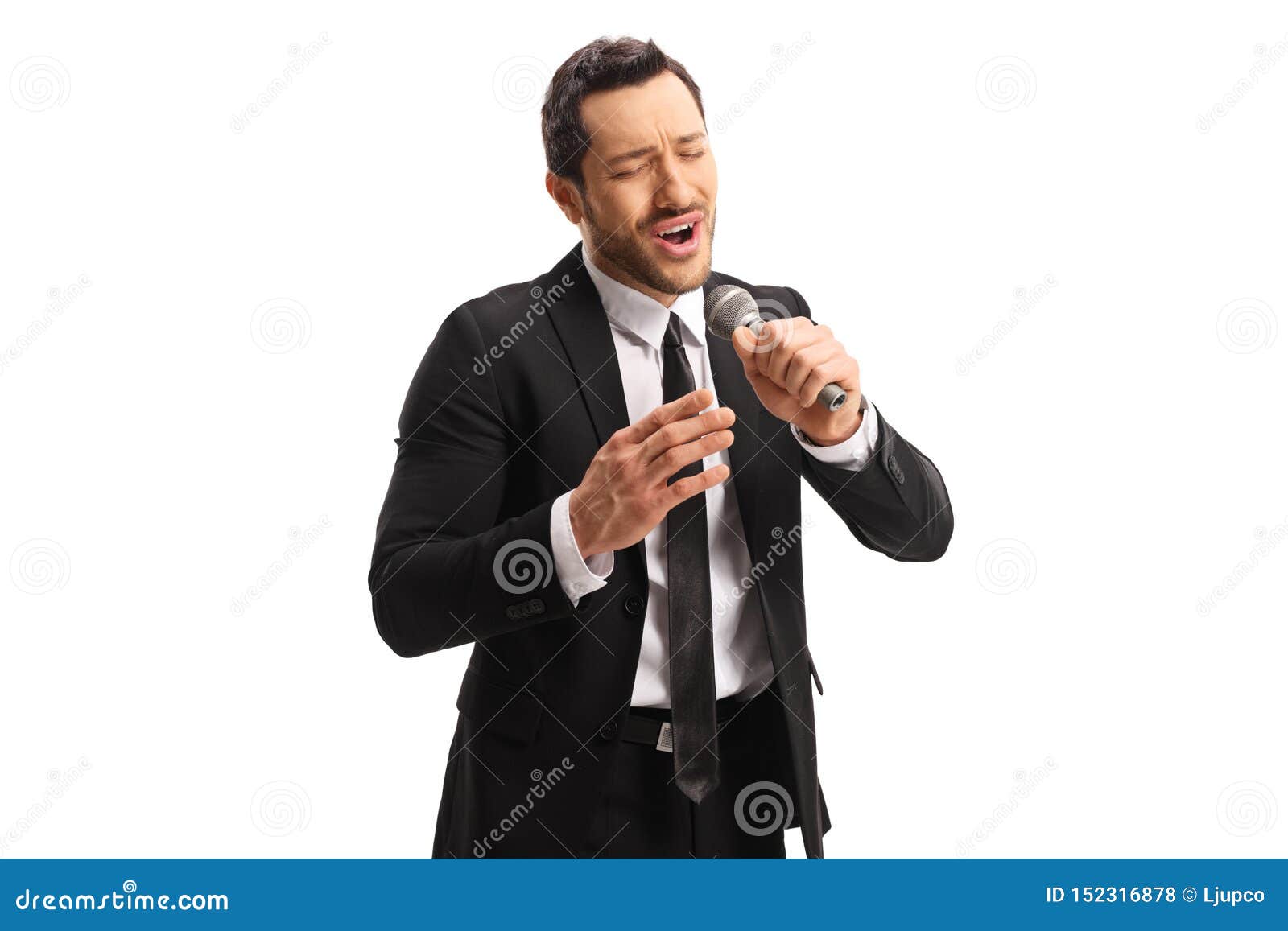 Man Singing on a Microphone with Emotional Face Expression Stock Photo ...