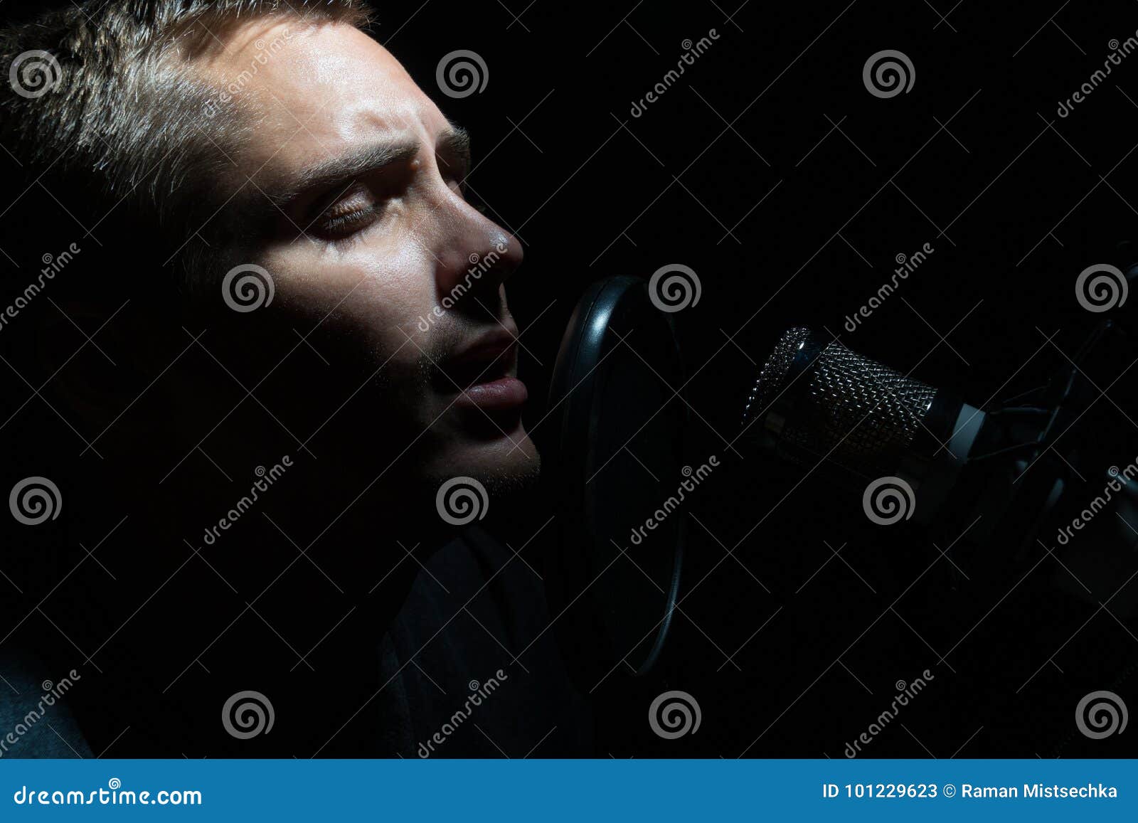 Man Singing in Recording Studio with Microphone Stock Image - Image of ...