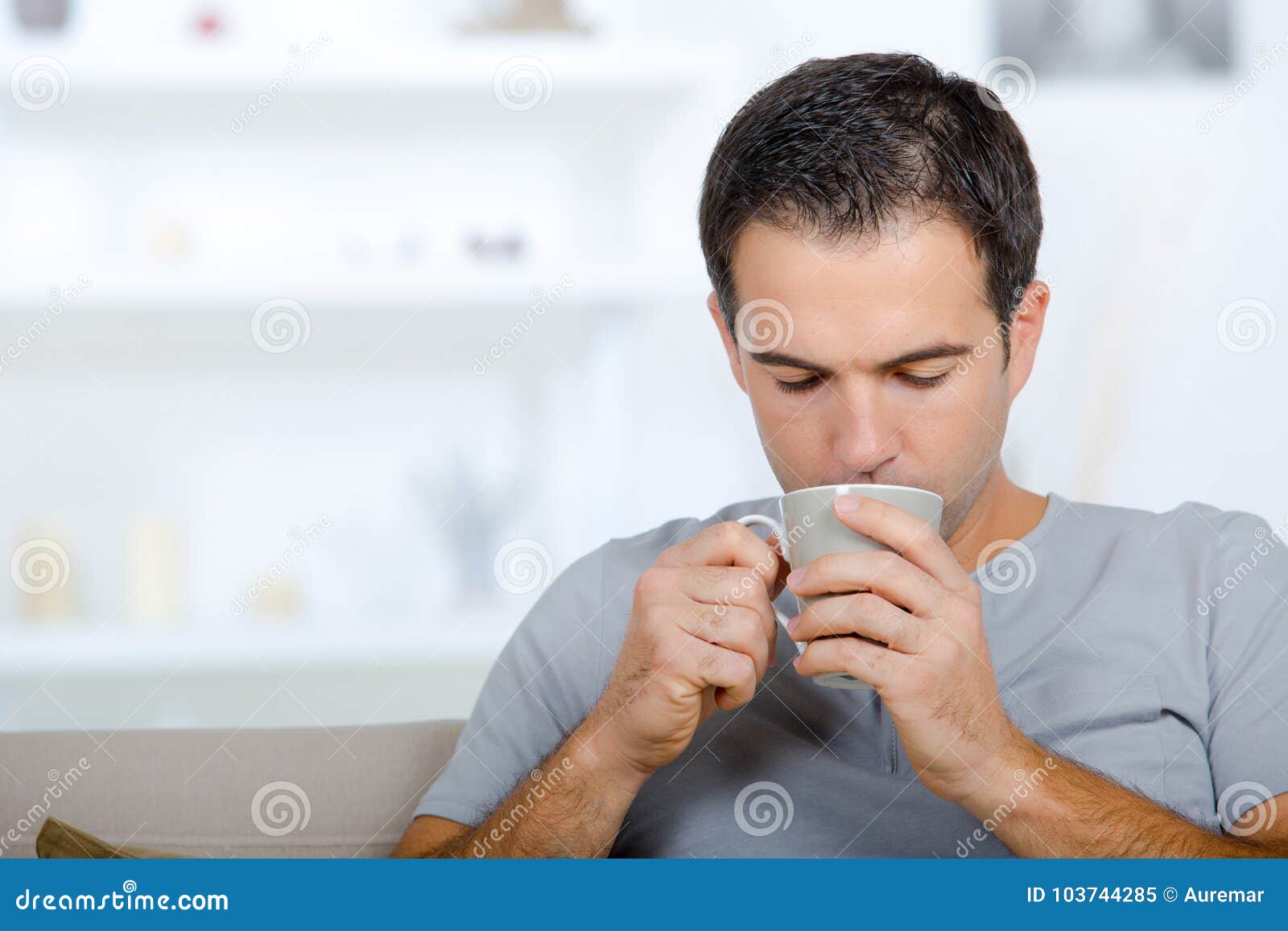 Man sipping hot beverage stock image. Image of individual - 103744285