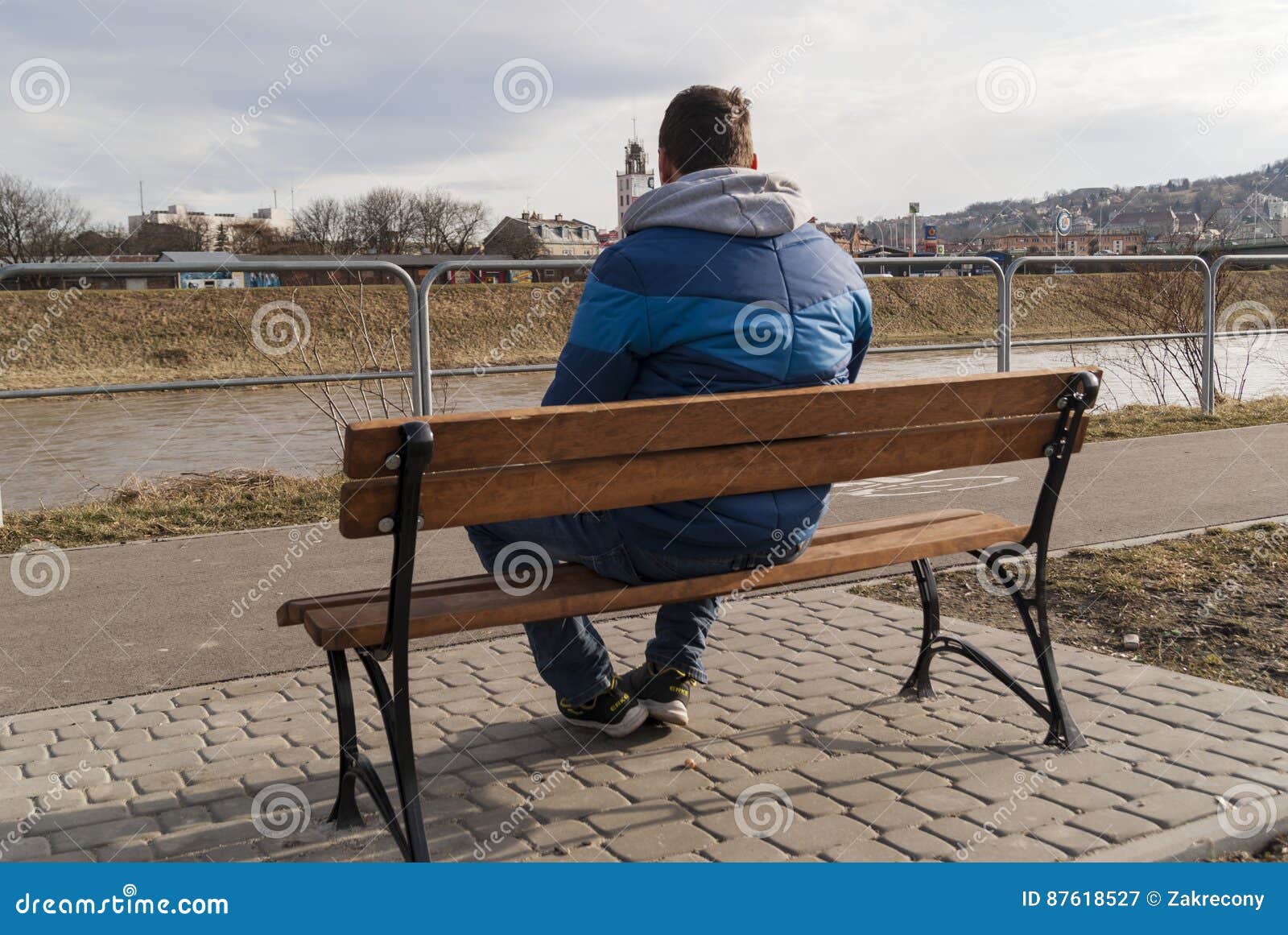 Man sit in the bench stock image. Image of smiling, male - 87618527