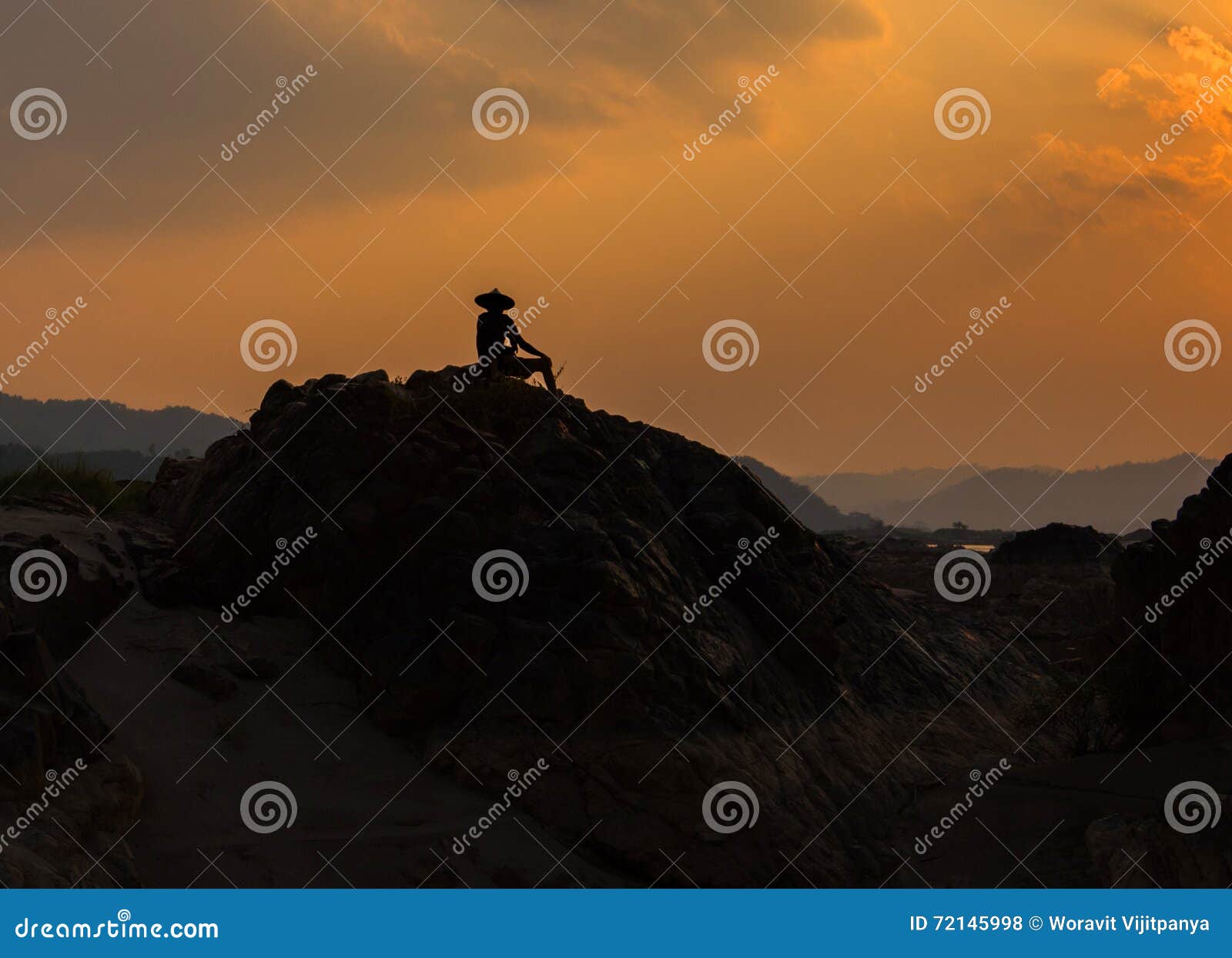 Man Sit on Rocks Silhouette Stock Photo - Image of warm, clouds: 72145998