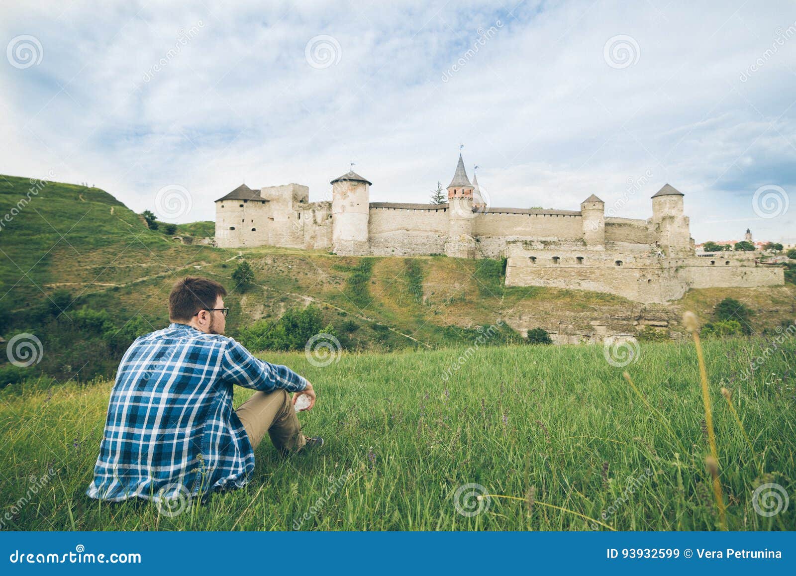 Man Sits Alone in Front of Old Castle Stock Image - Image of adult ...