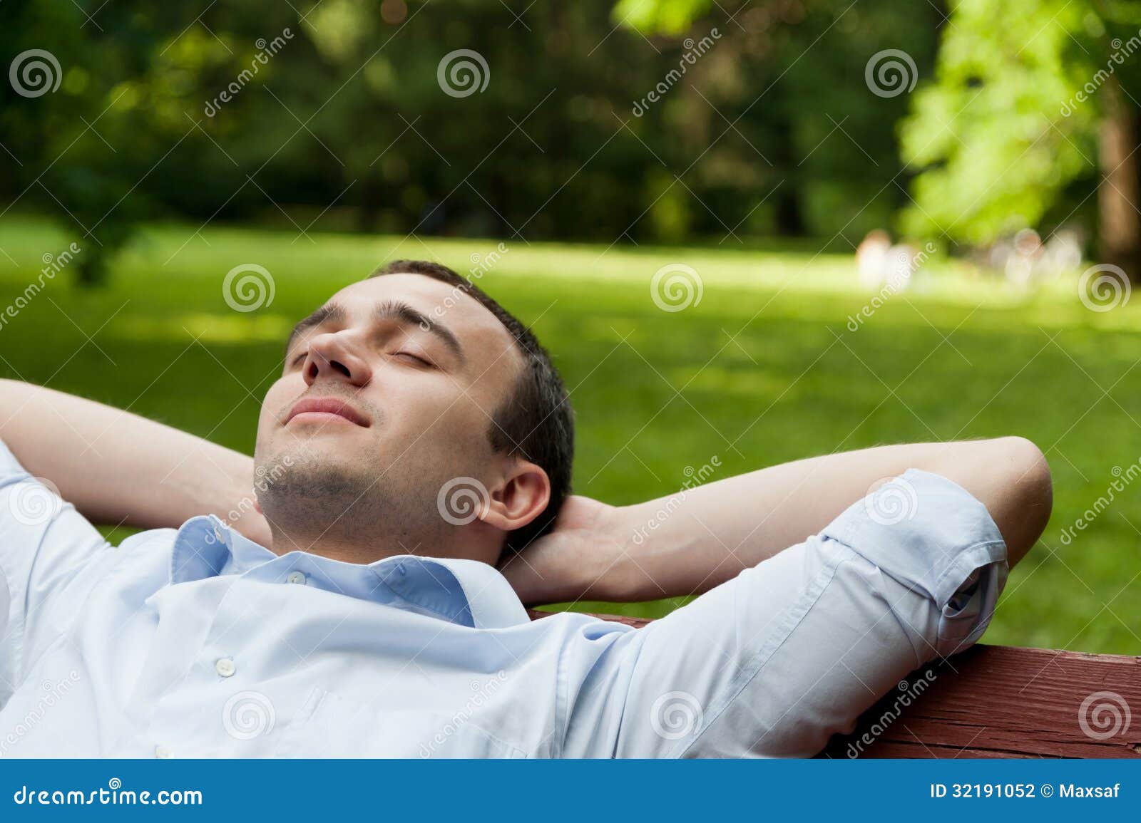 Man sits on bench stock photo. Image of casual, adult - 32191052
