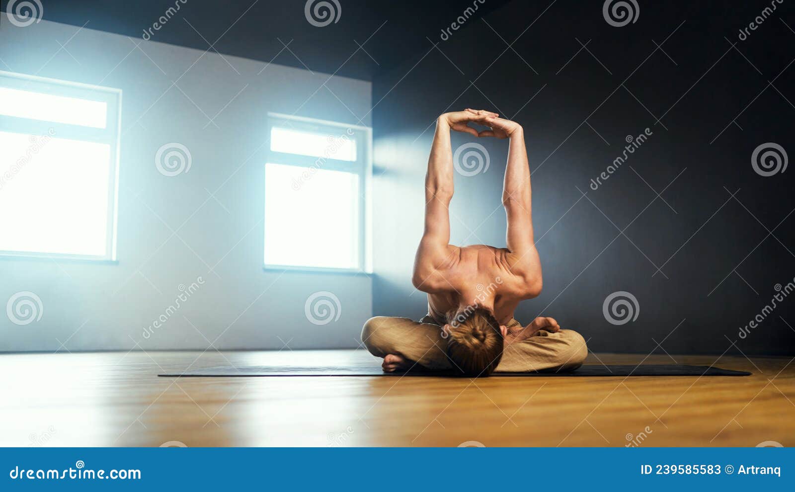 The Man Sits with an Inclination with Hands Clasped in the Lock. Yoga ...