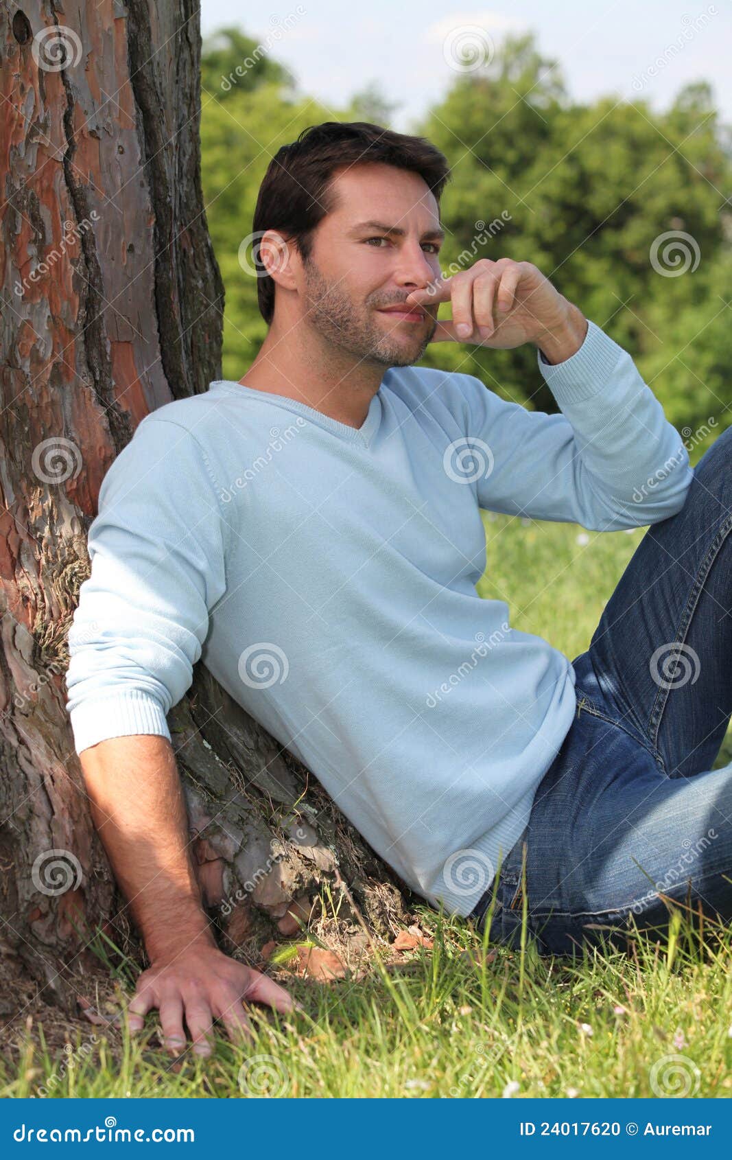 Man Sitting Against a Tree. Stock Photo - Image of adult, sunny: 24017620