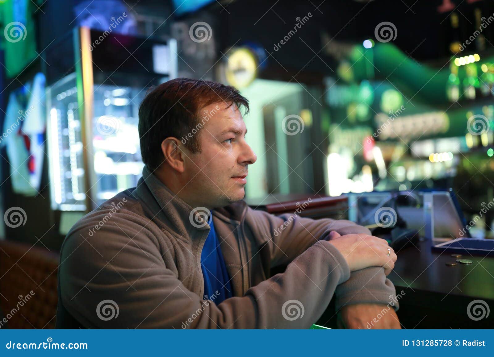 Man sitting at bar stock photo. Image of portrait, party - 131285728