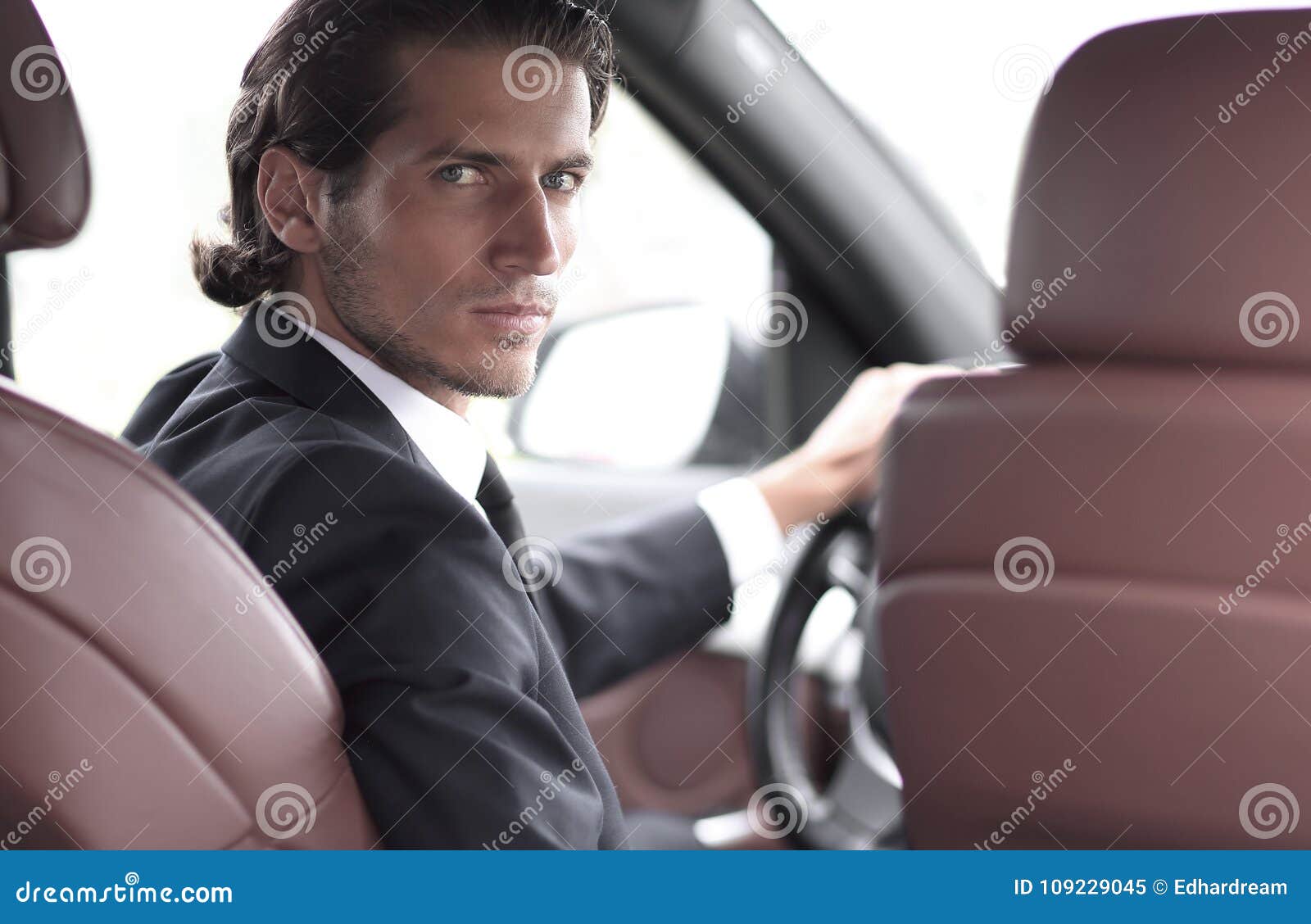 Man Sitting Behind the Wheel of a Car Stock Image - Image of lifestyles ...