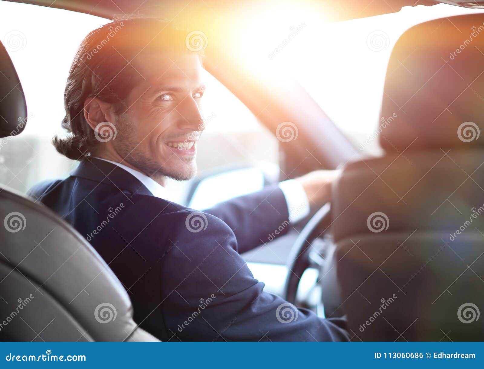 Man Sitting Behind the Wheel of a Car Stock Photo - Image of casual ...