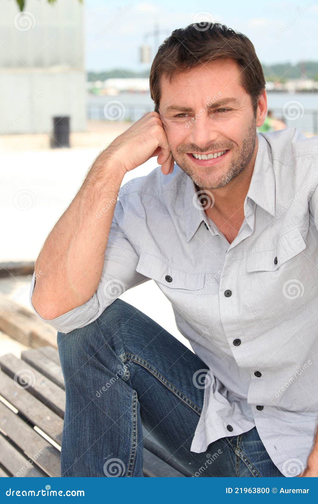 Man sitting on bench stock photo. Image of looking, happiness - 21963800