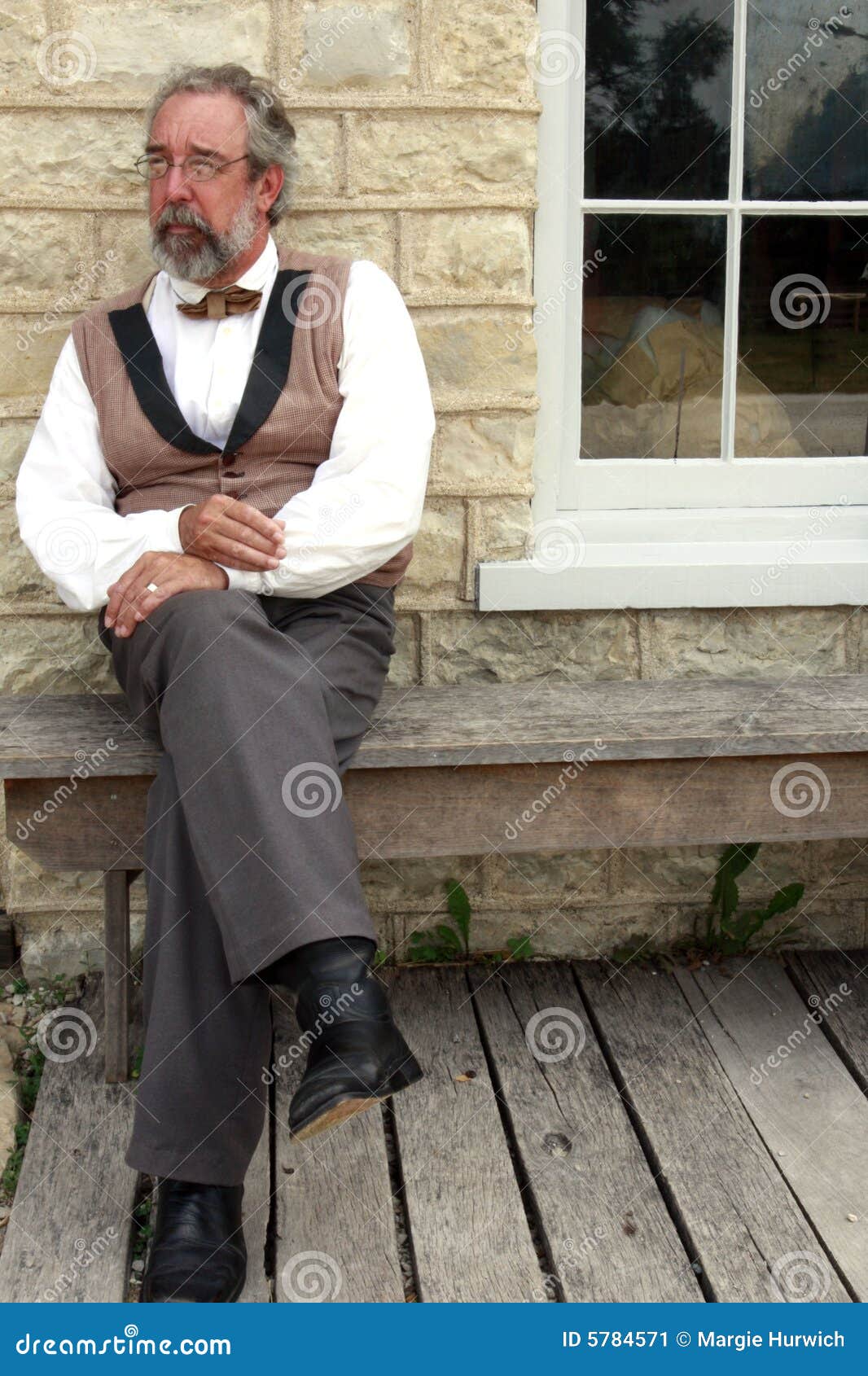 Man sitting on bench stock image. Image of expression - 5784571