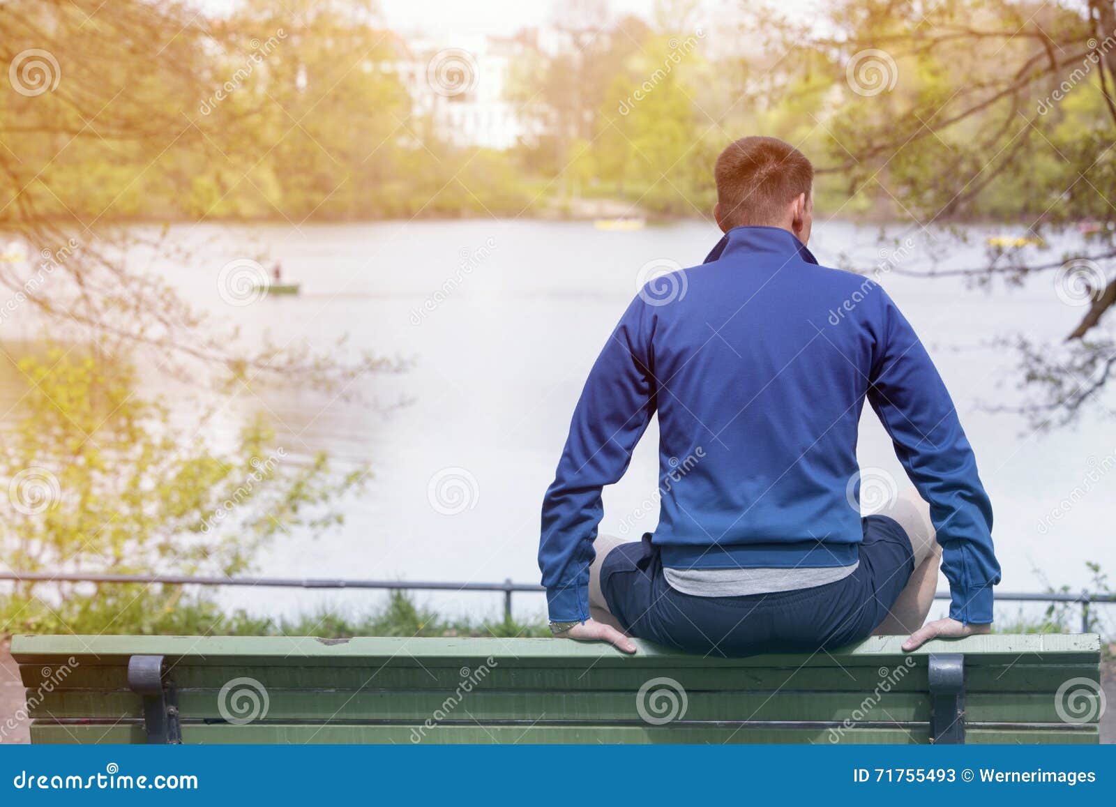 Man Sitting on Bench and Looking at a Lake Stock Image - Image of ...
