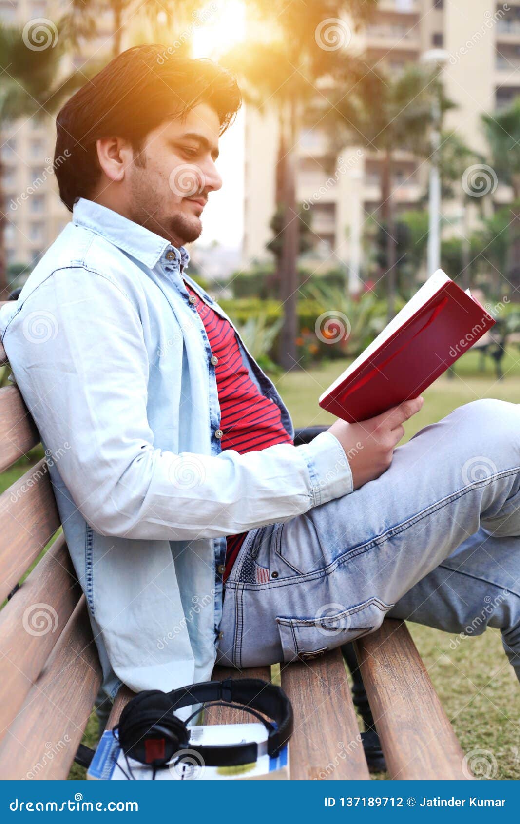 Man is Sitting on the Bench and Looking Work in Diary Stock Photo ...