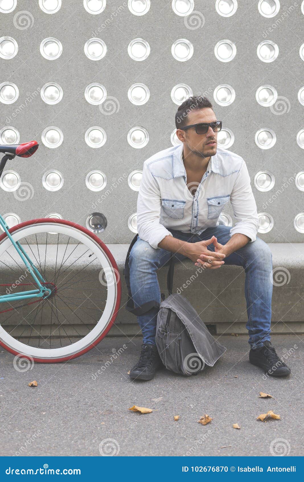 Man Sitting on a Bench in the Park Relaxed and Thinking Stock Photo ...