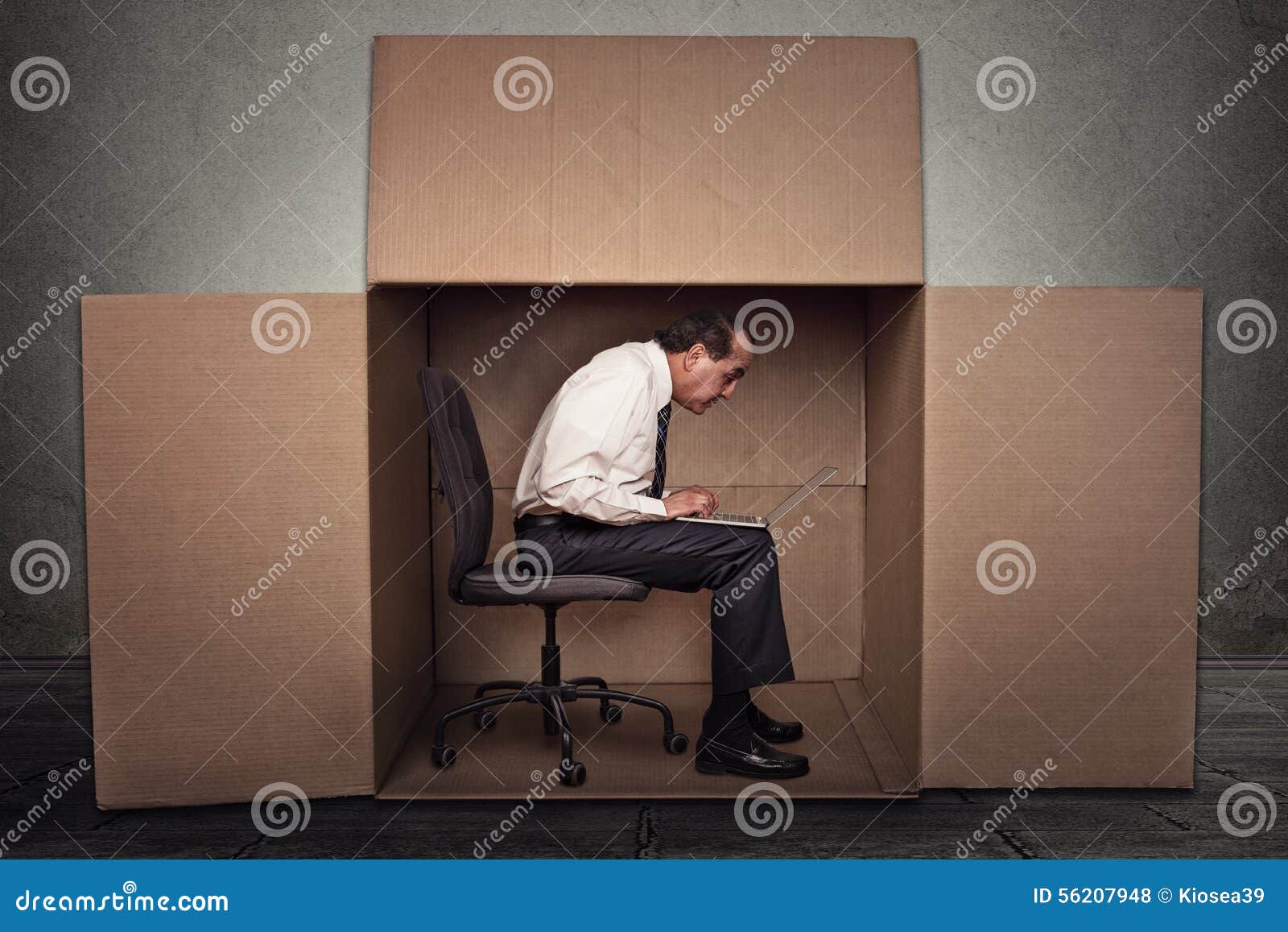 Man Sitting in a Box Working on Laptop Computer Stock Photo - Image of ...