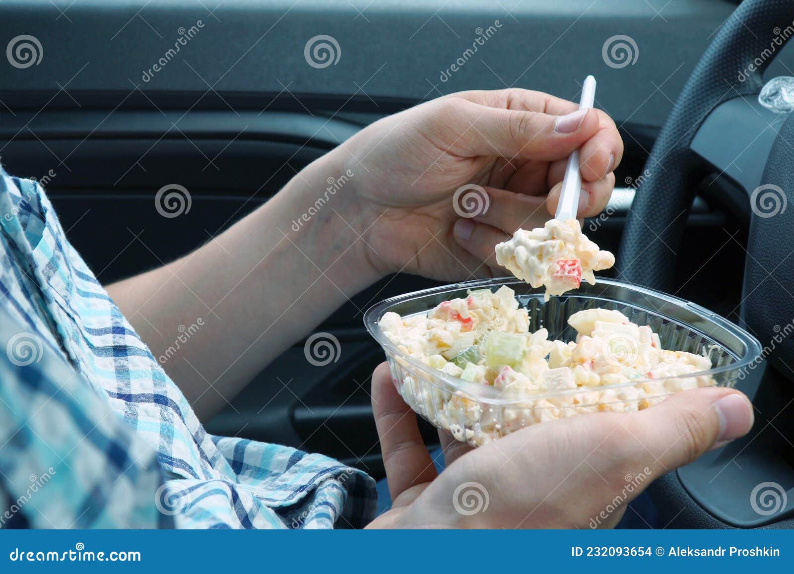 Man, Sitting in a Car, Eats a Salad with Mayonnaise from Plastic ...