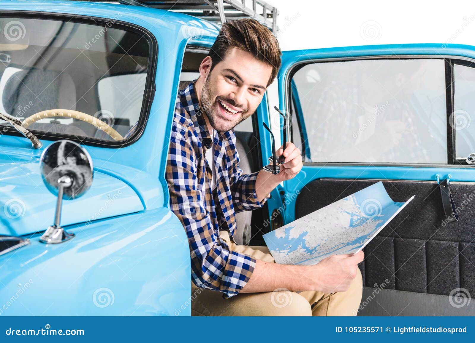 Man Sitting in Car with Map Stock Image - Image of shirt, traveller ...