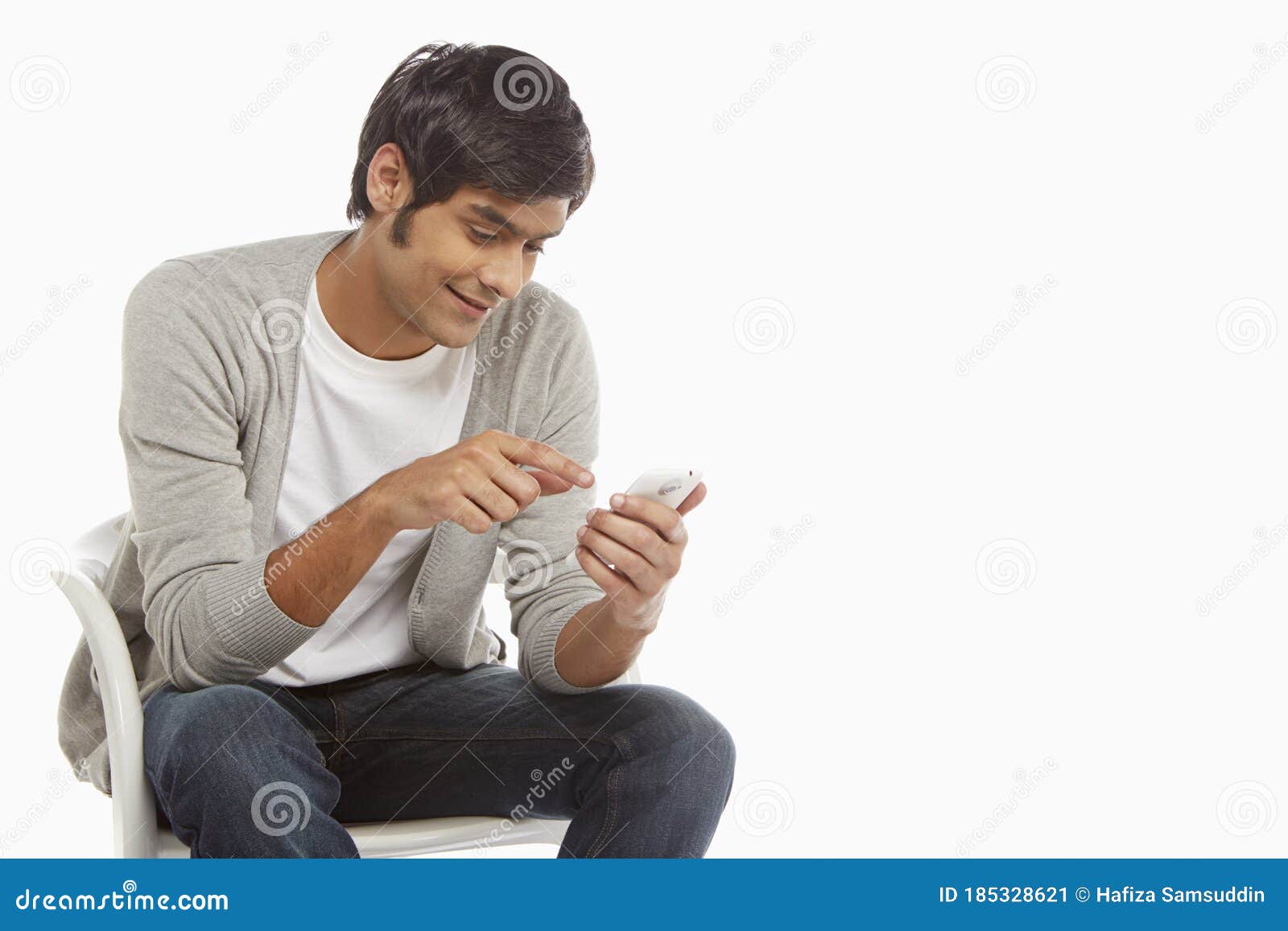Man Sitting on a Chair, Text Messaging Stock Image - Image of ...