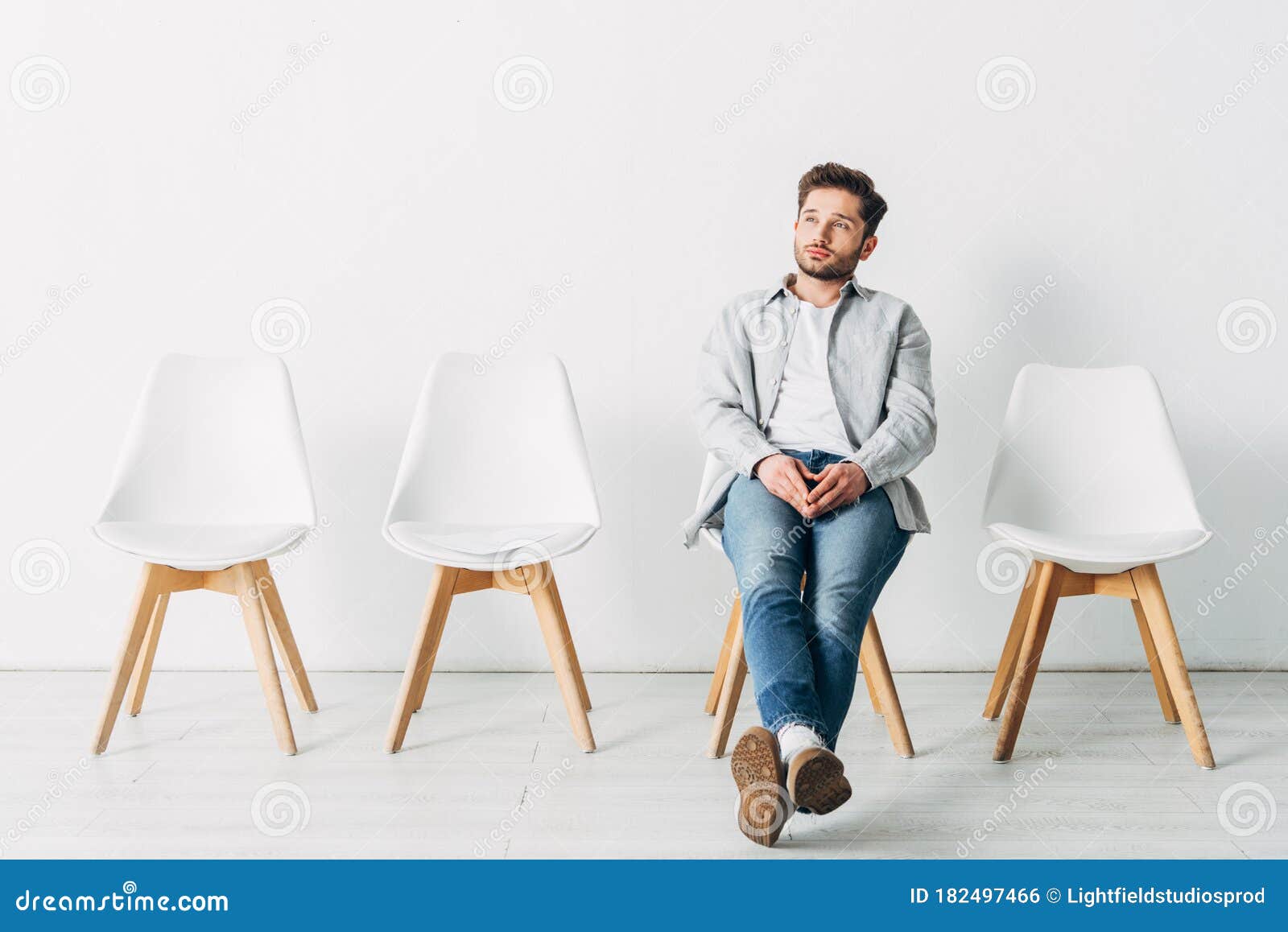 Man Sitting on Chair while Waiting for Recruitment Stock Photo - Image ...