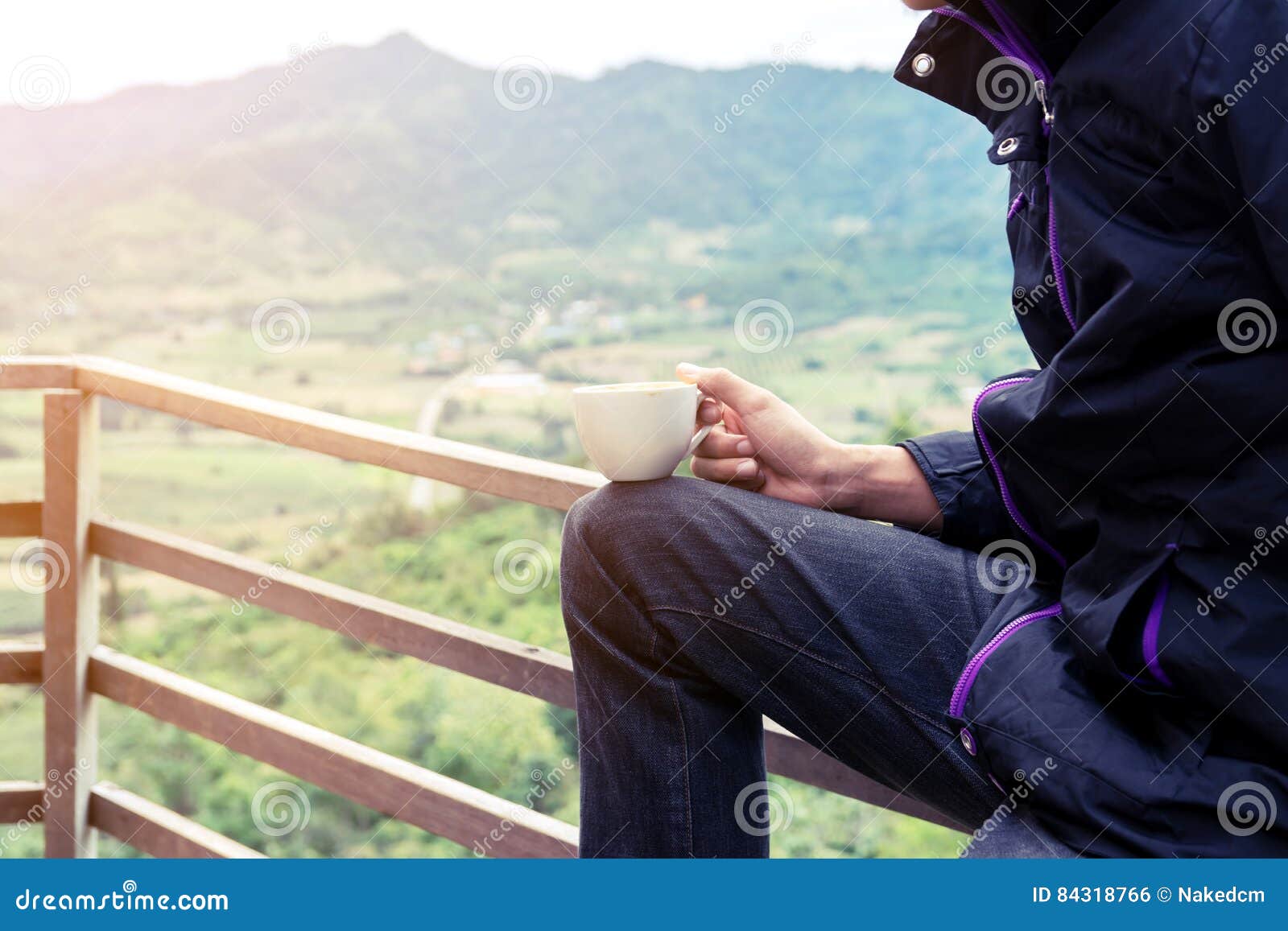 Man Sitting with Coffee Cup at View Point Stock Photo - Image of point ...