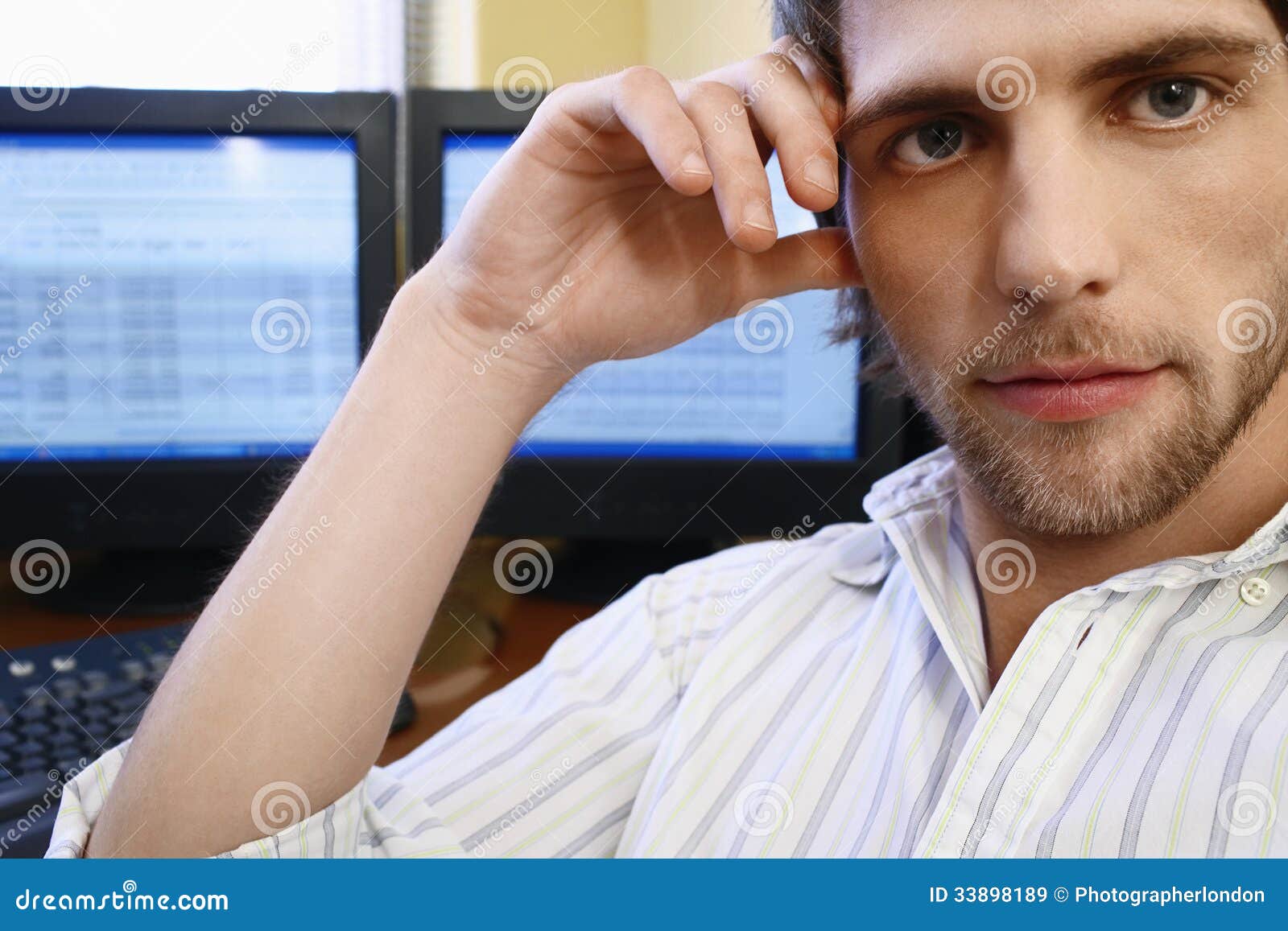 Man Sitting at Computer Desk Stock Image - Image of internet, serious ...