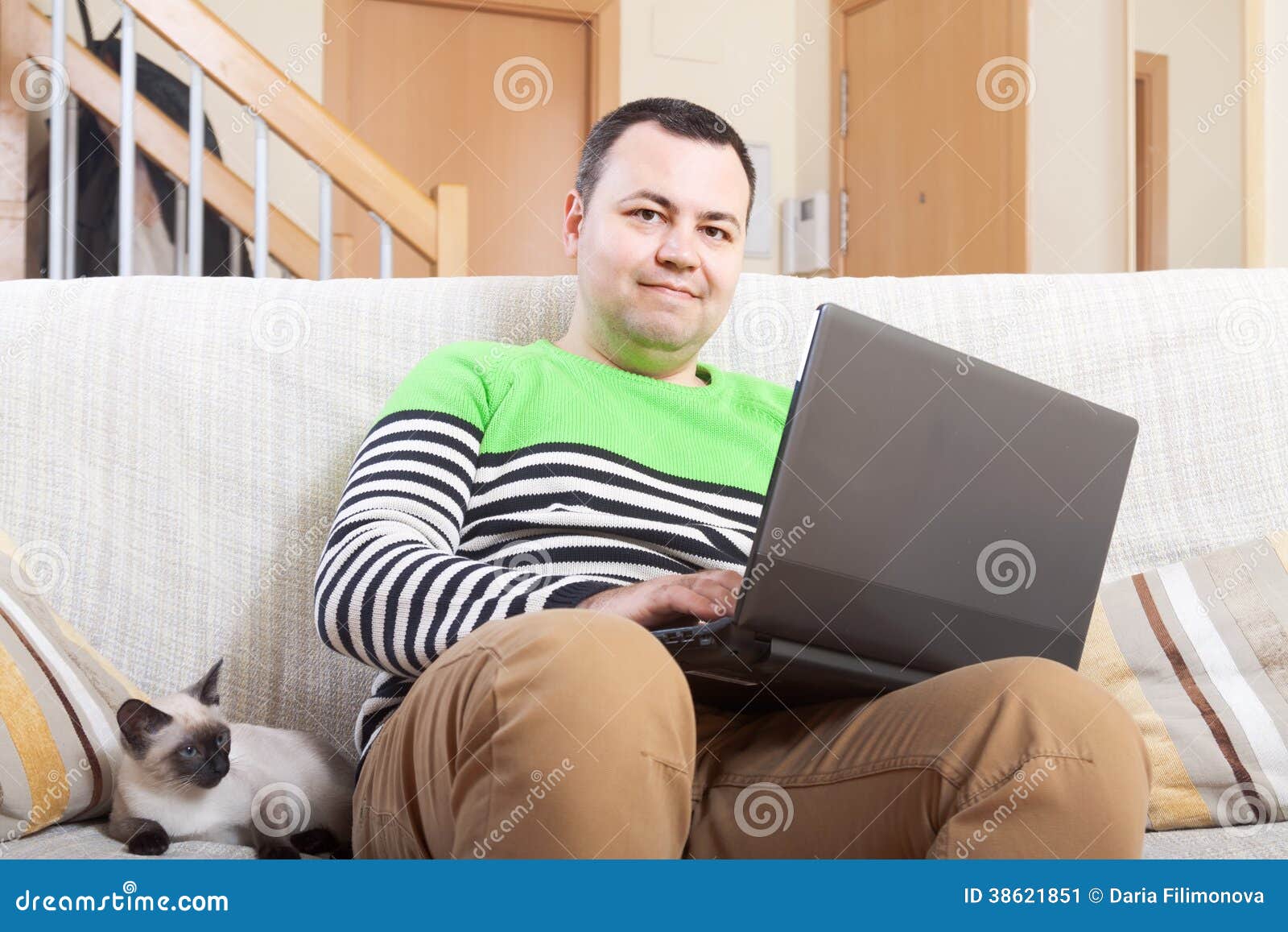Man sitting at computer stock image. Image of people - 38621851